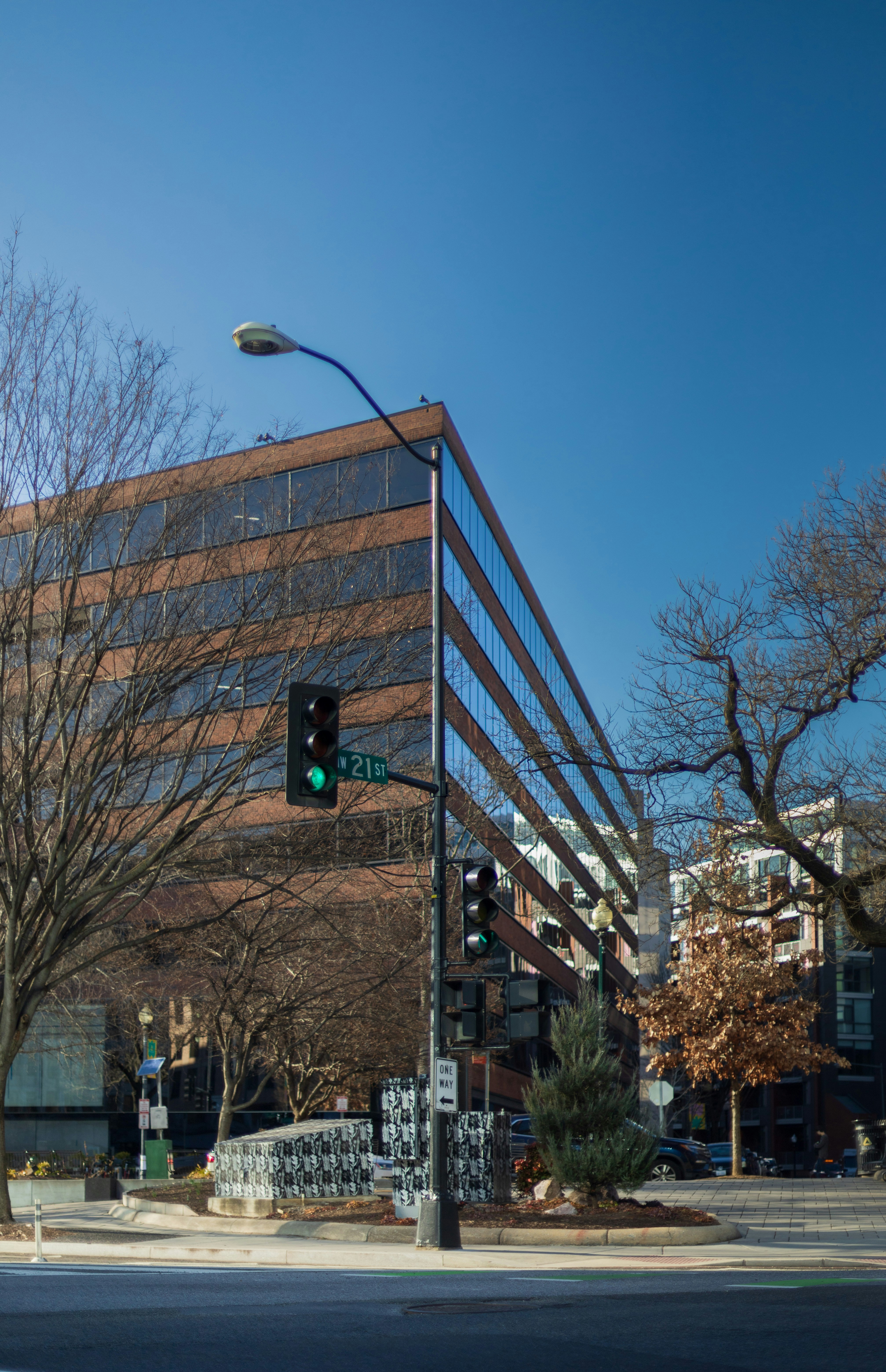 Azure Sky over 21st Street: The Brick-and-Glass City Block