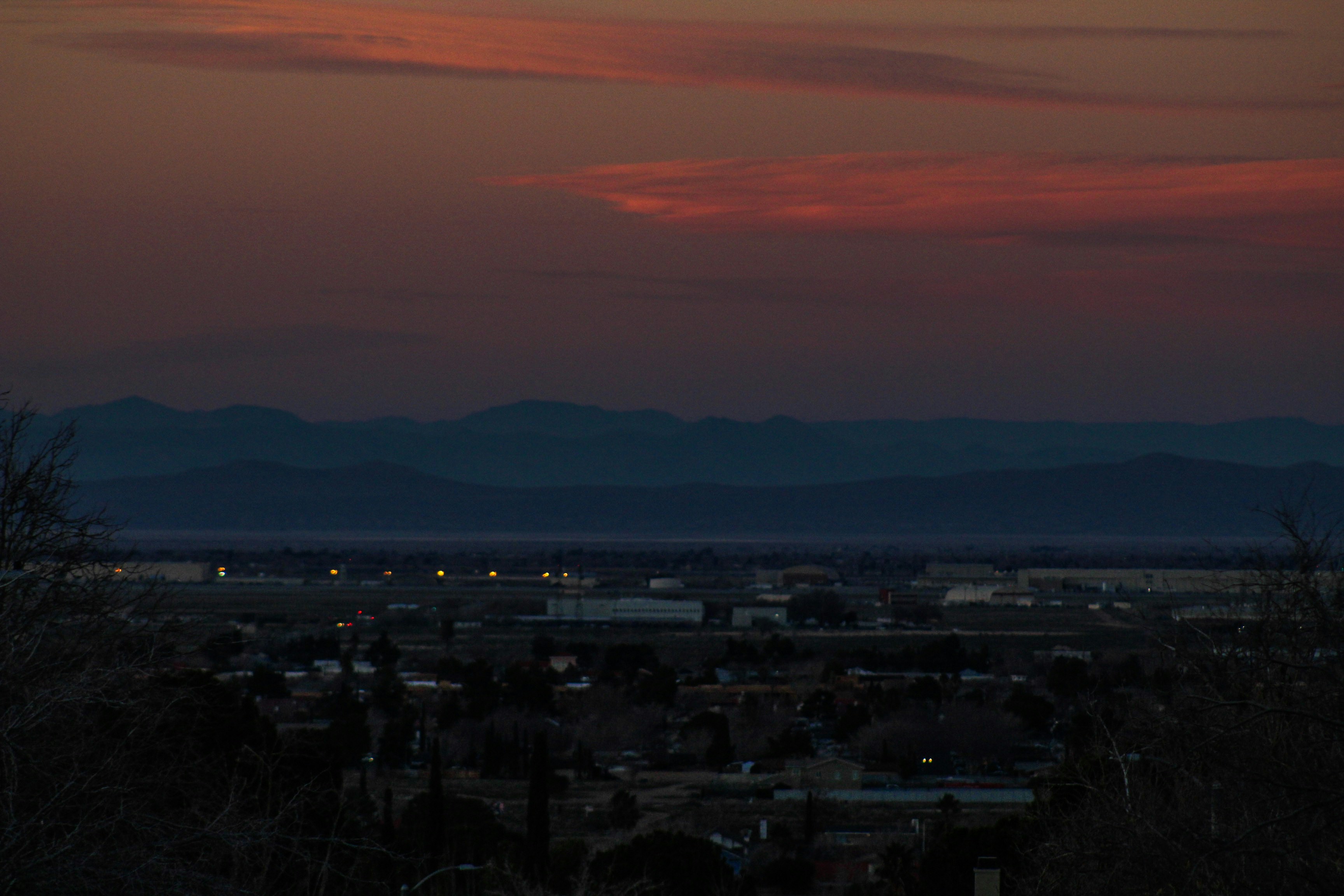Distant Twilight Plains Over a Quiet City