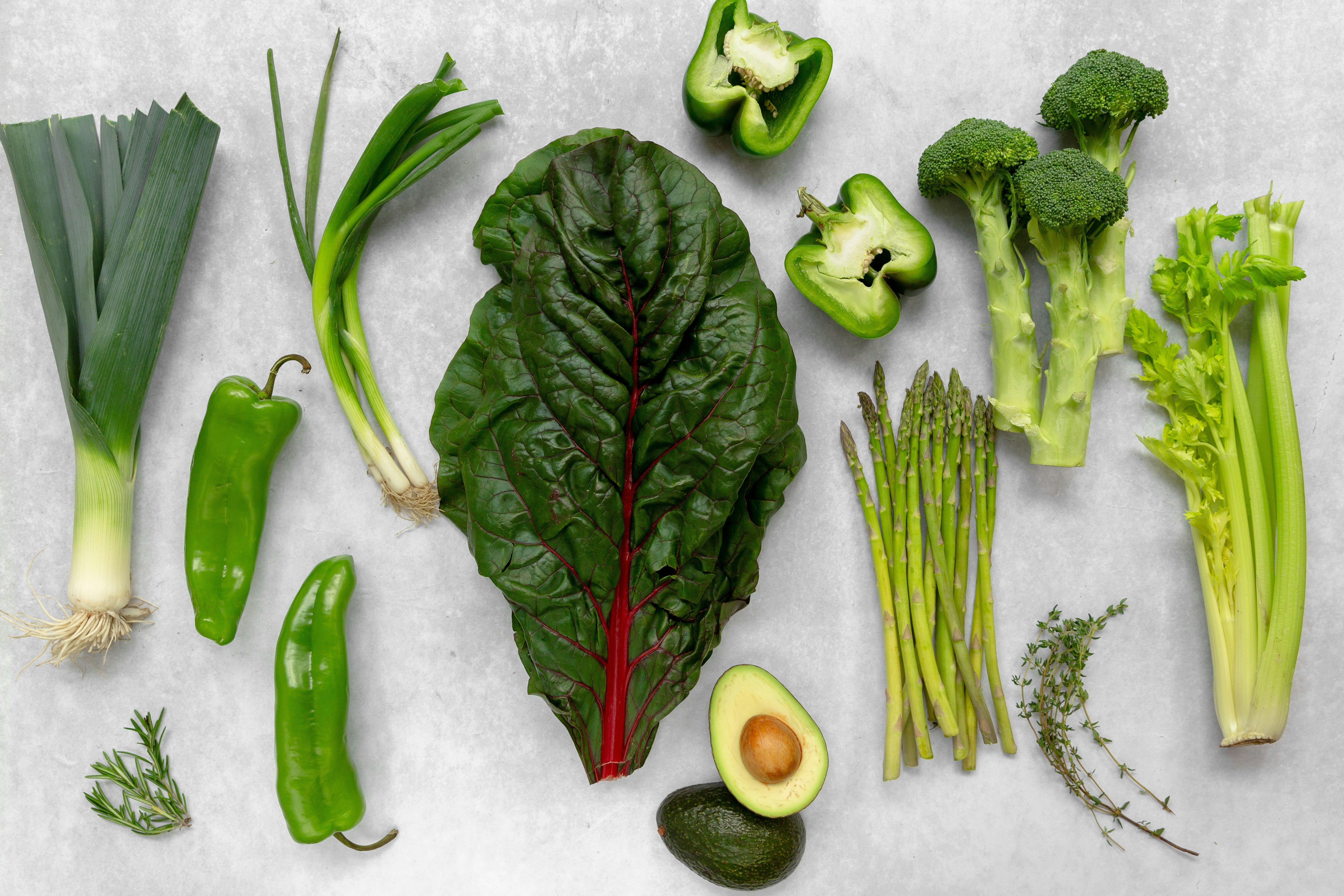 A variety of vegetables are laid out on a table photo – Free Flatlay ...