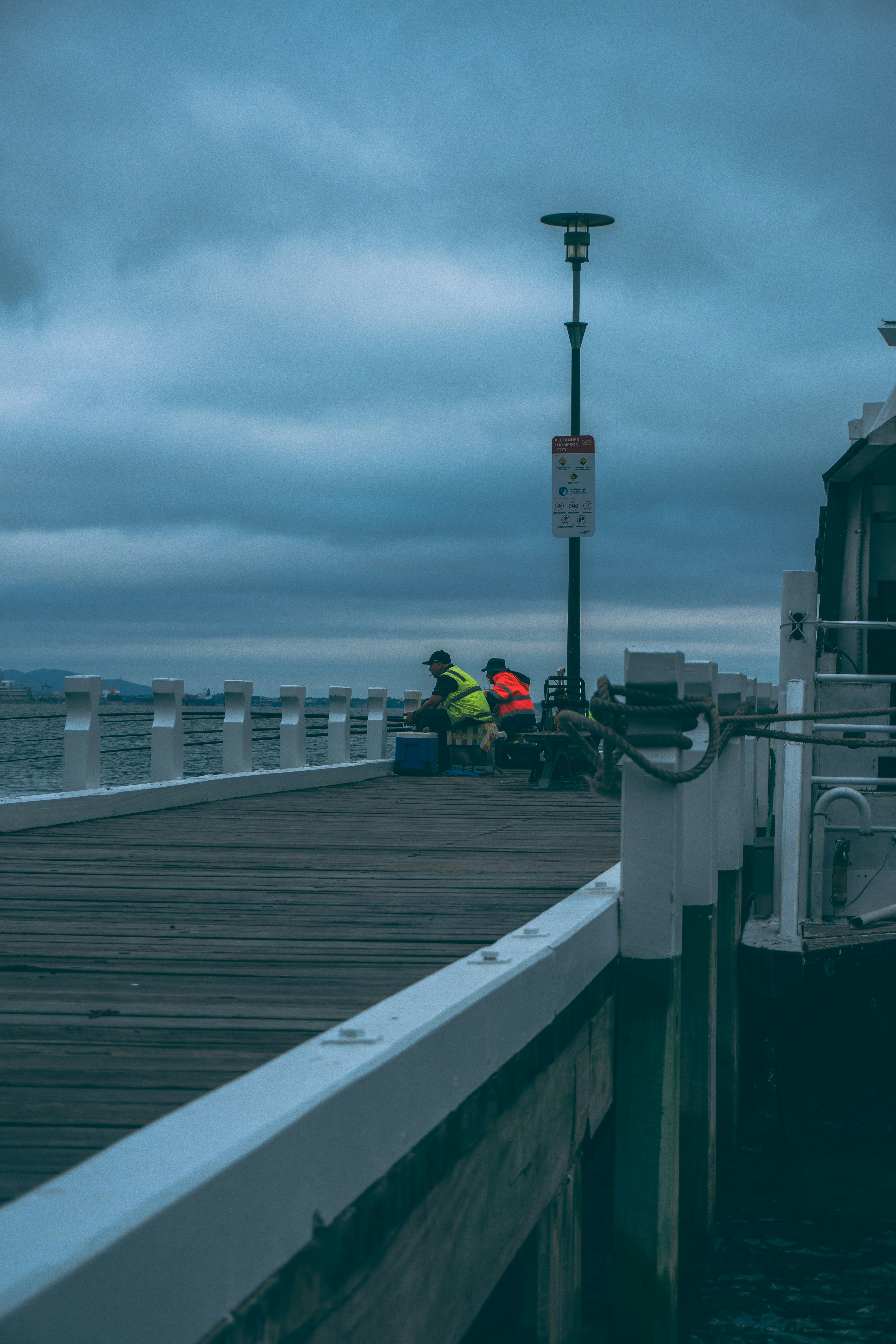 Quiet Moments on a Stormy Pier