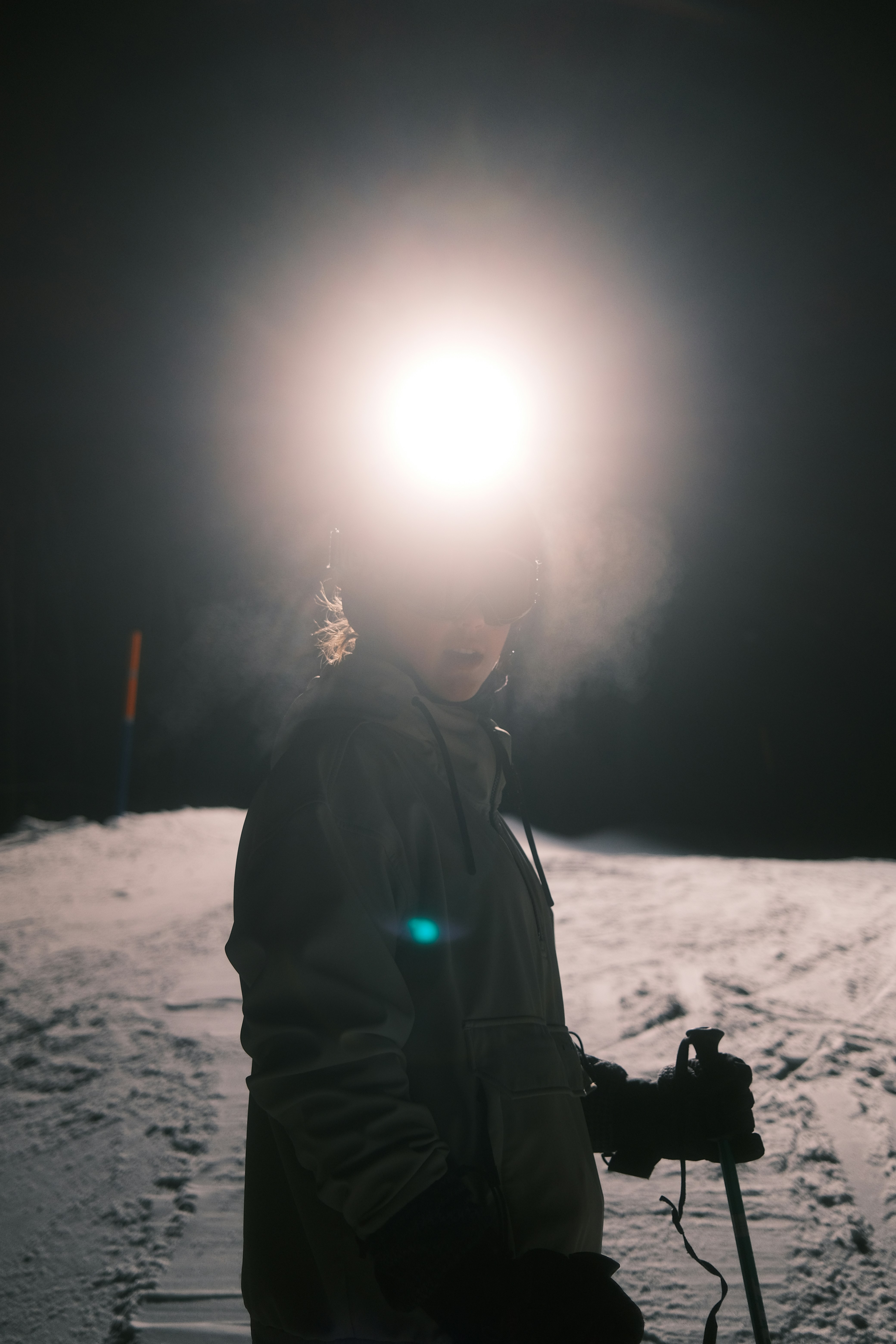 Backlit in Snow: A Night Portrait Shrouded by a Blinding Halo
