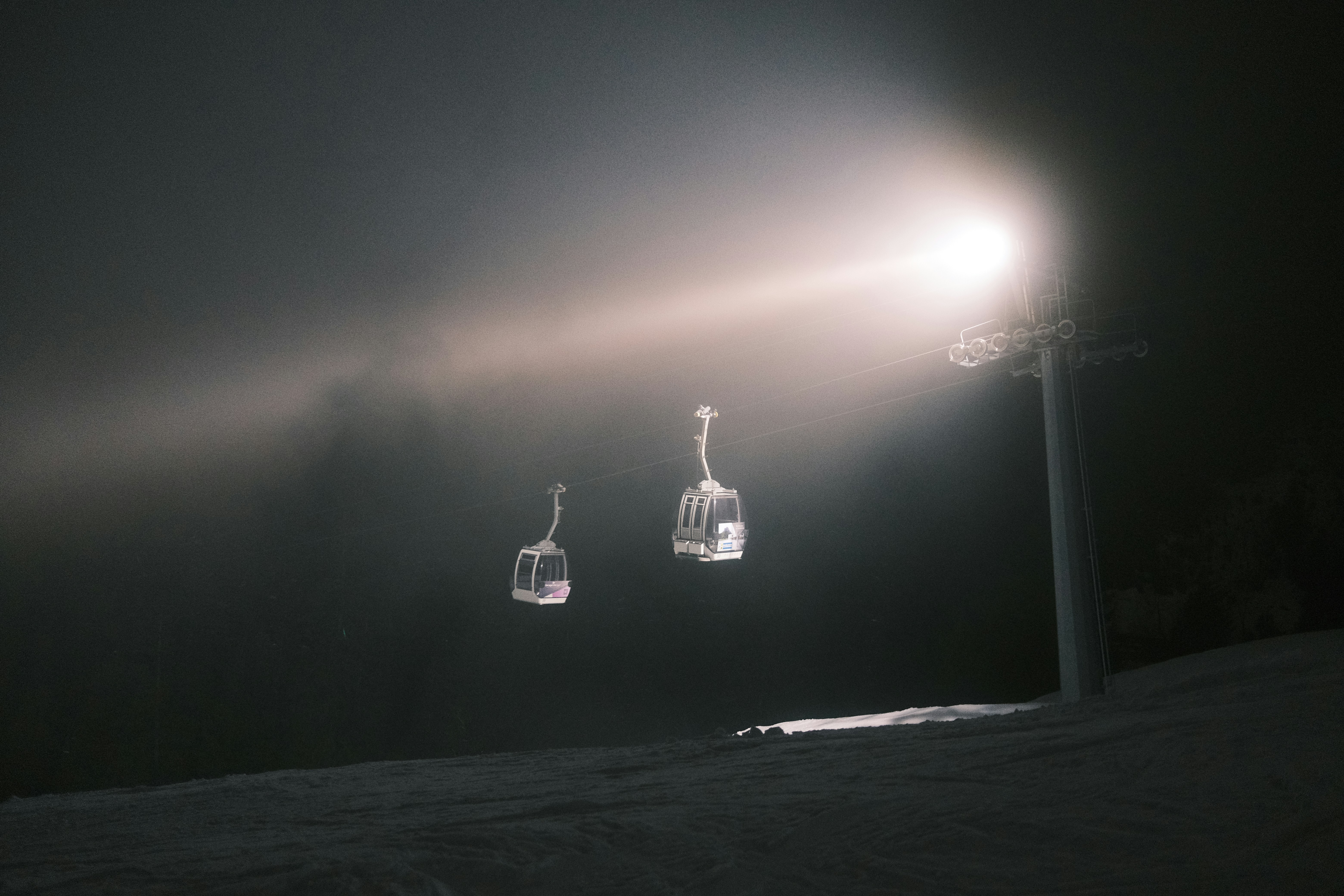 Moonlit Lift: Twin Gondolas in a Velvet Night