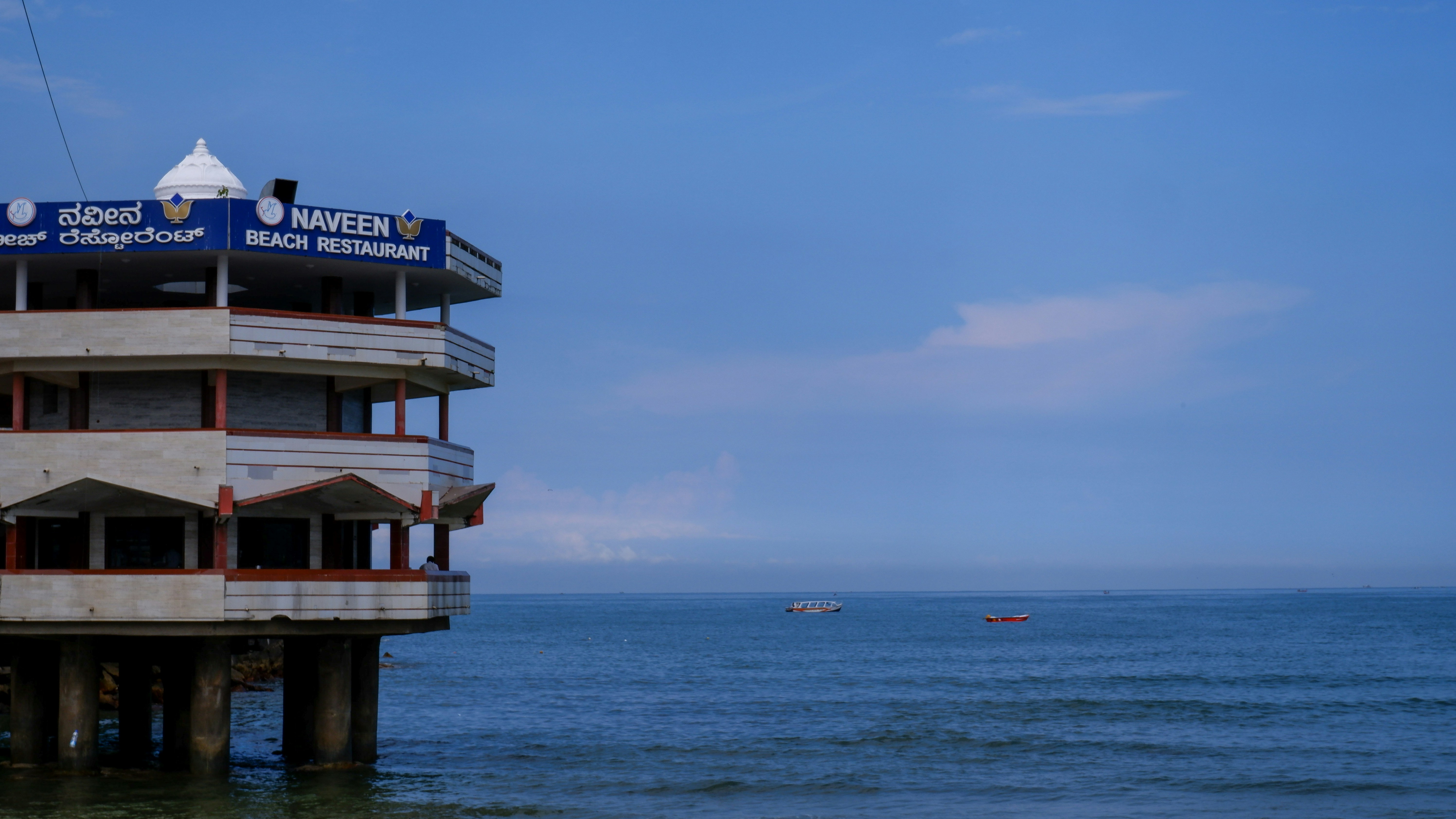Stilted Coastal Café Over a Quiet Atlantic