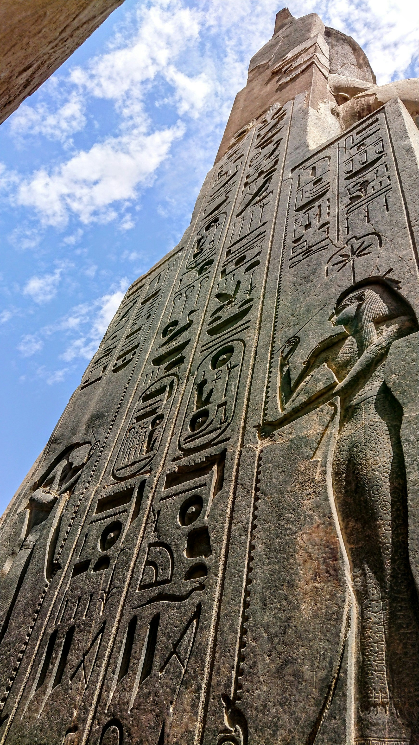 A tall stone tower with egyptian writing on it photo – Free Egypt Image ...