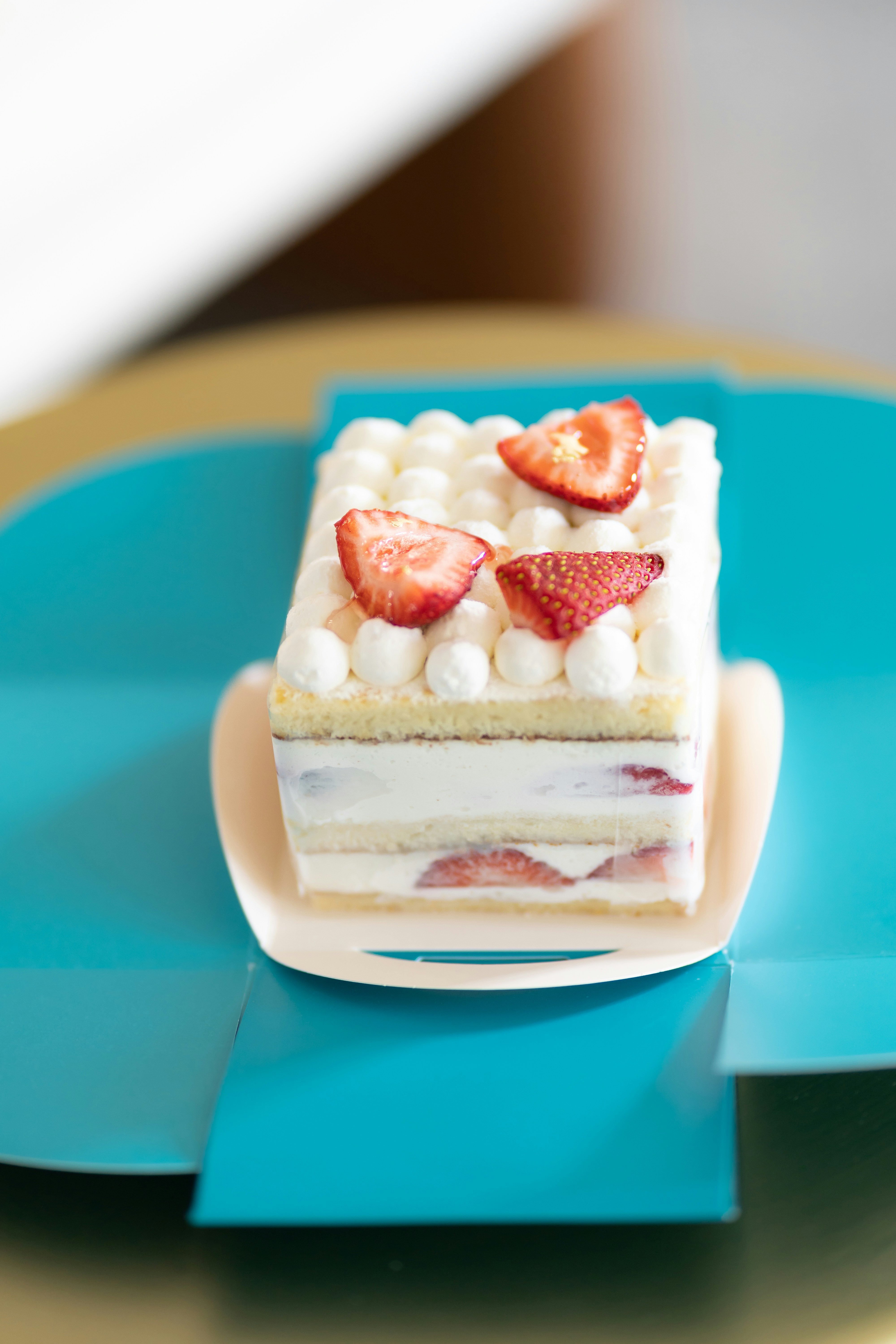 Turquoise Spotlight on a Petite Strawberry Layer Cake