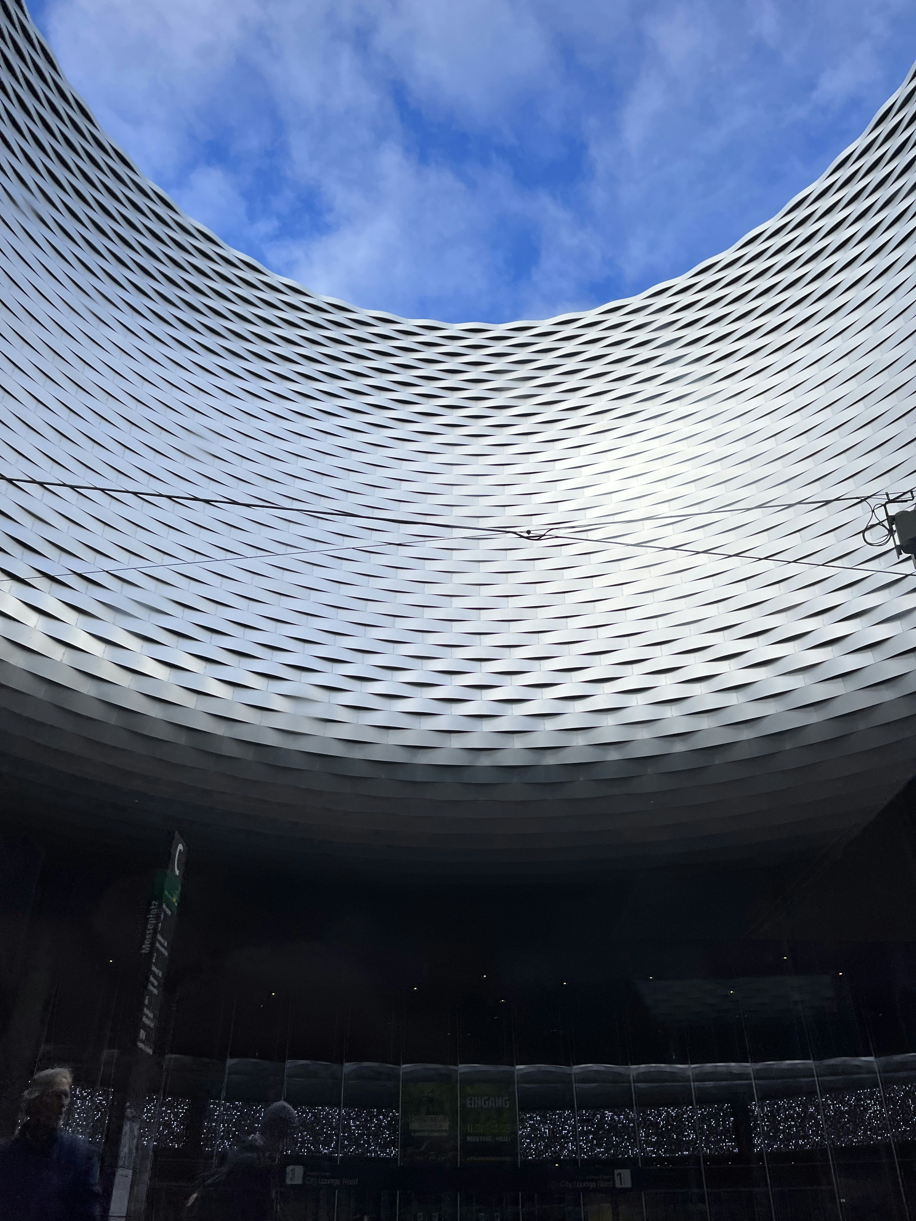 A curved building with a sky background photo – Free Basel Image on ...