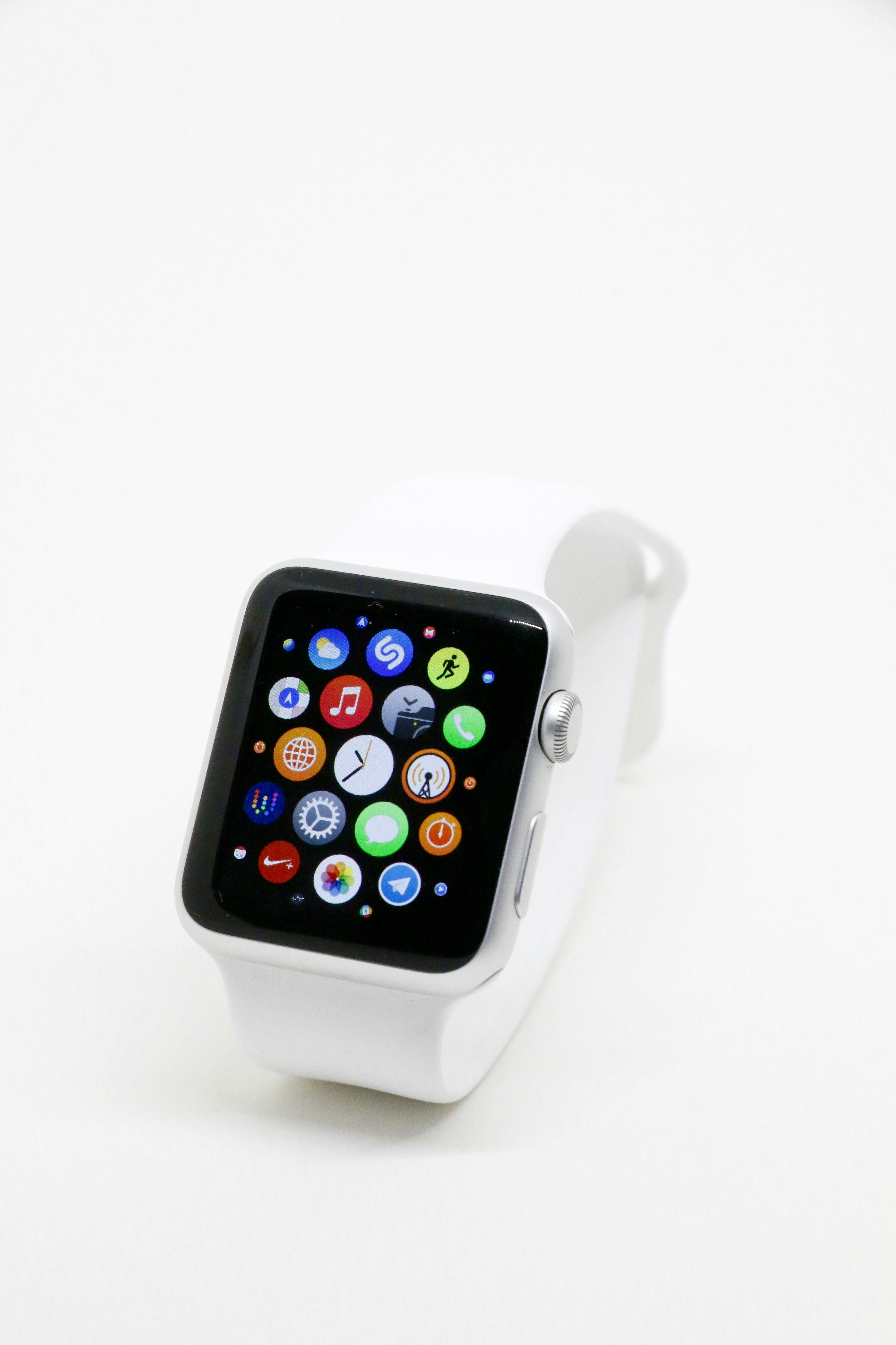 A white apple watch sitting on top of a white table photo – Free Watch ...