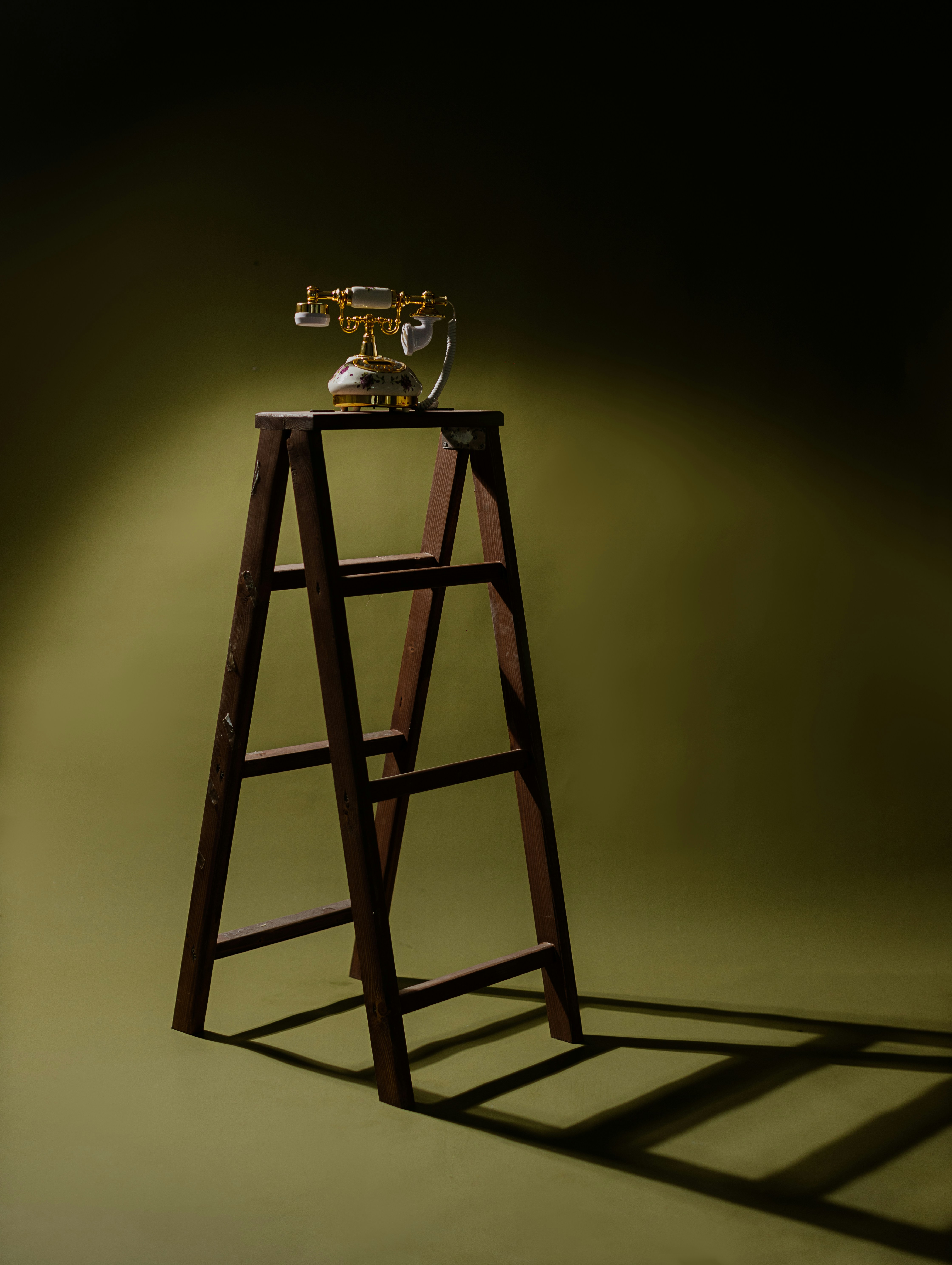 A ladder with a trophy on top of it photo – Free Vintage Image on Unsplash