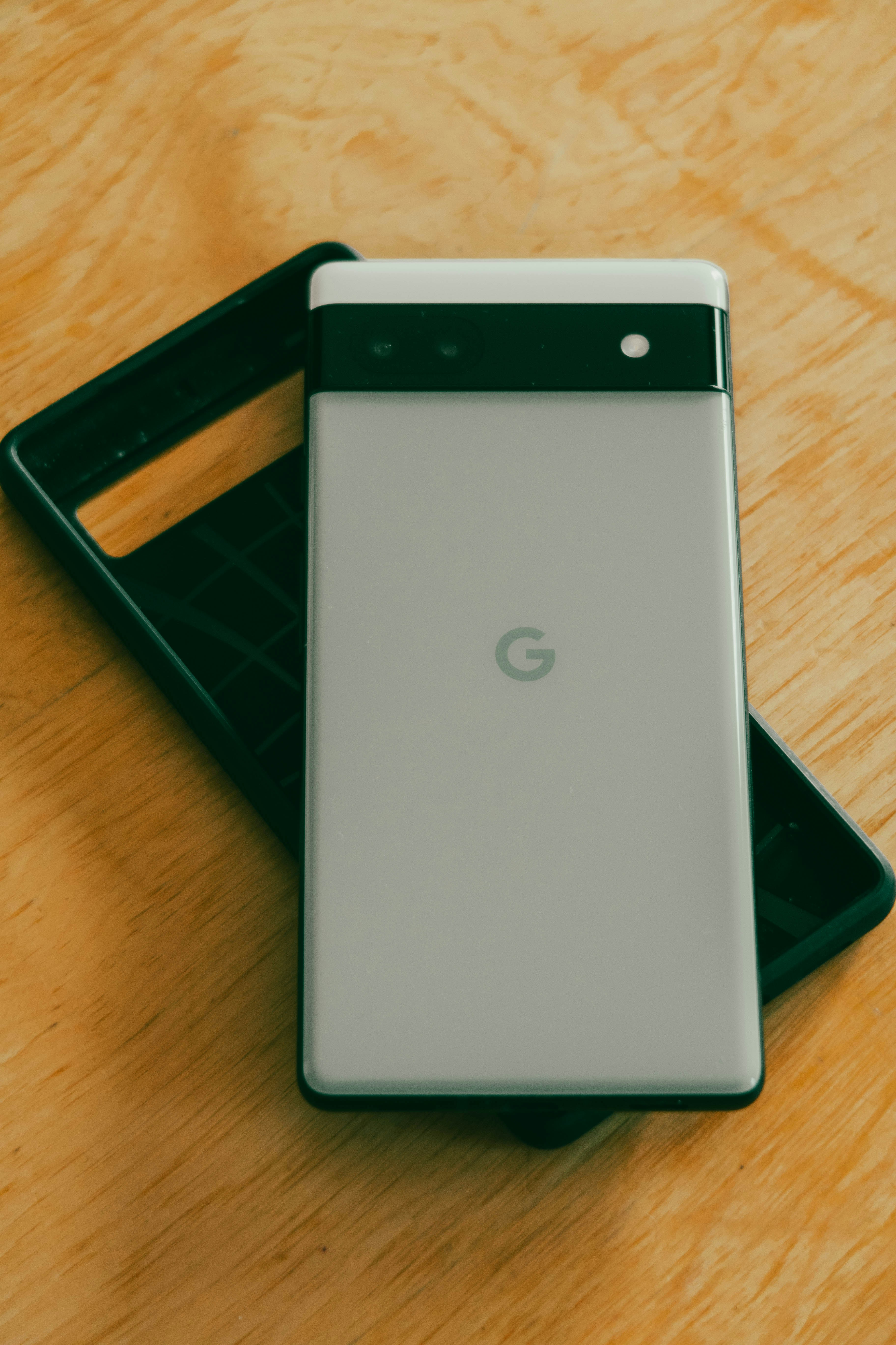 A close up of a cell phone on a table photo – Free Phone Image on Unsplash