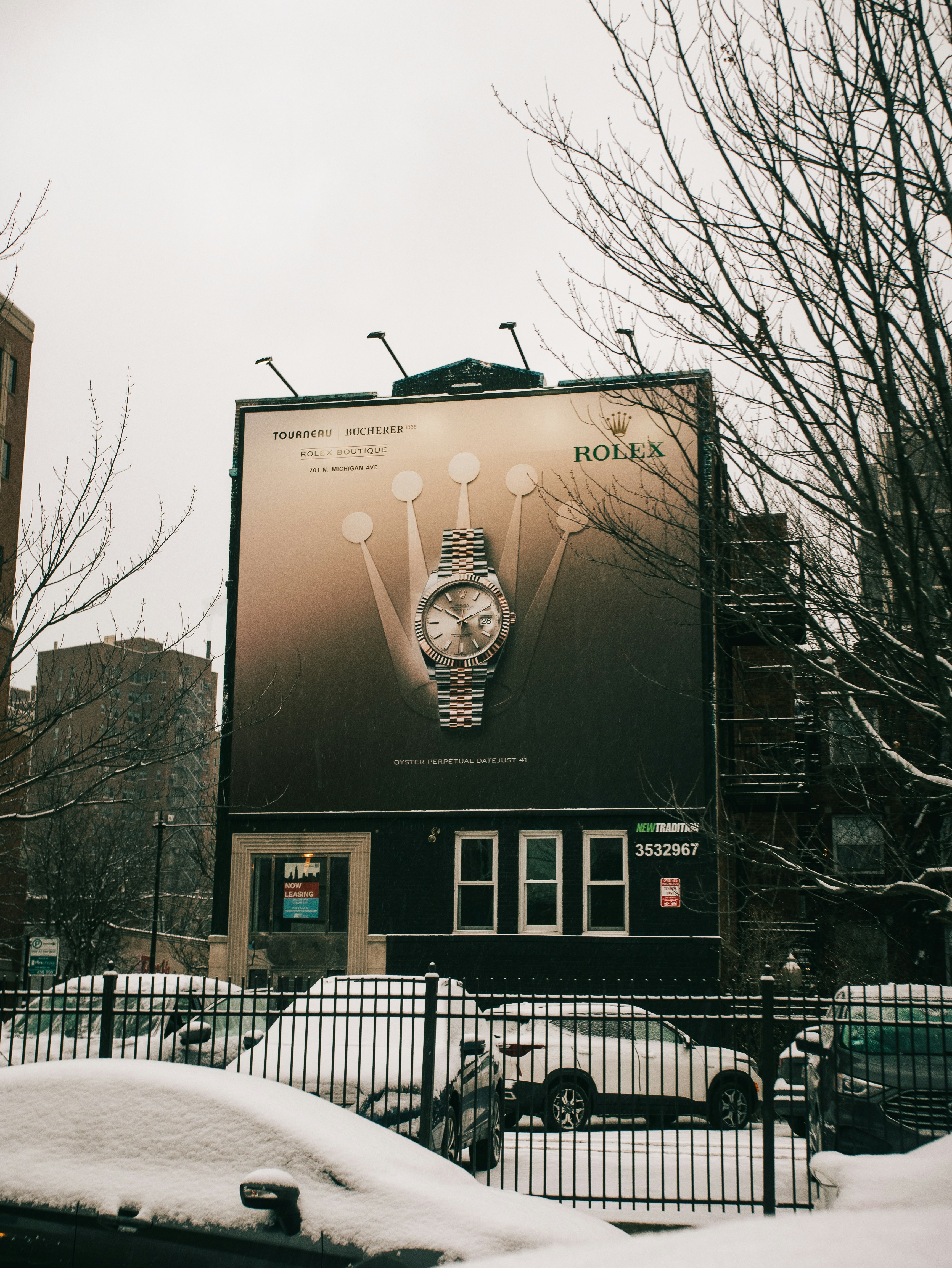 A large billboard on the side of a building photo – Free Poster Image ...