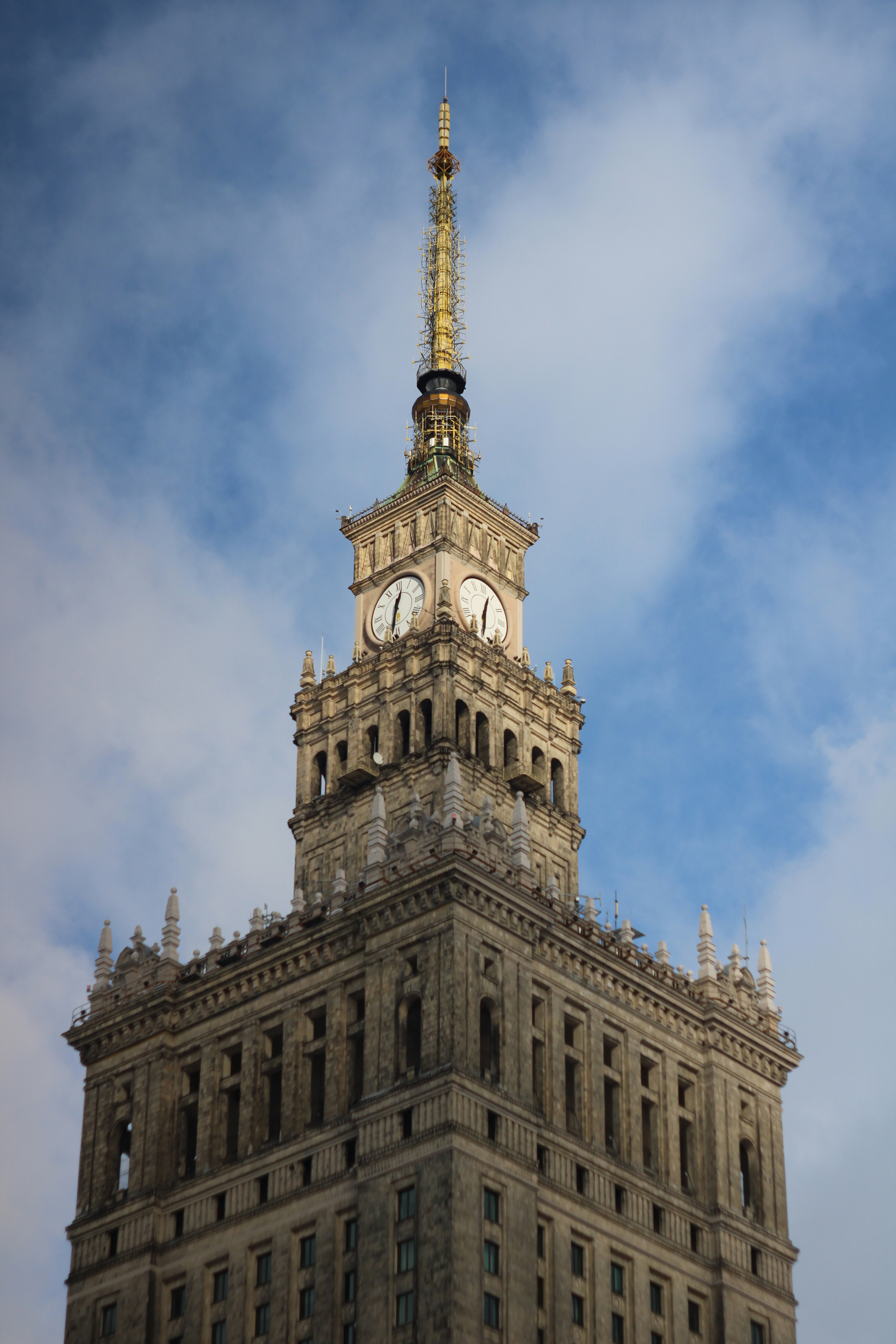 A tall clock tower with a sky background photo – Free Warszawa Image on ...