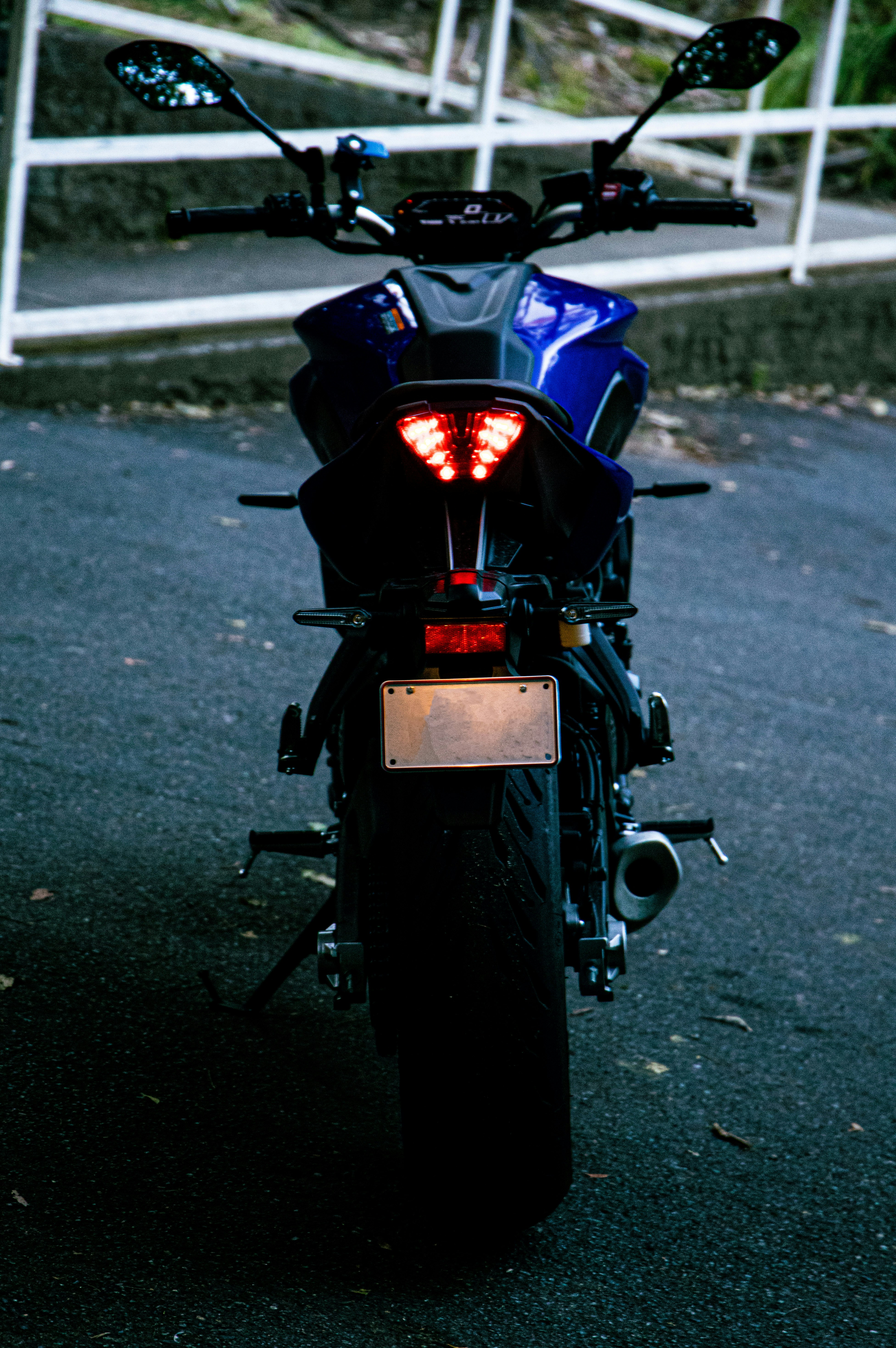 Rear-Glow: Night-blue Sportbike in Quiet Parking
