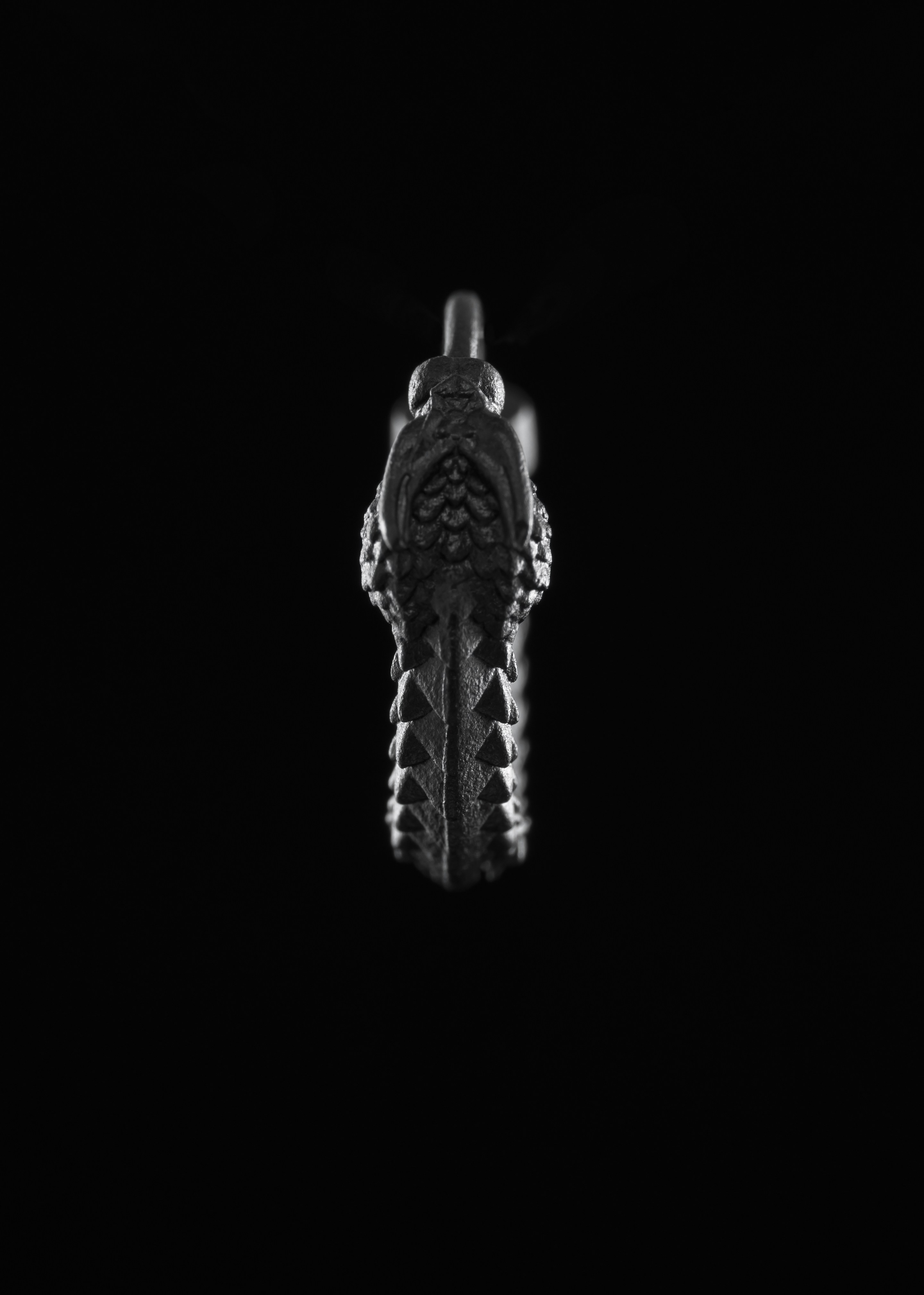 a black and white photo of a motorcycle tire