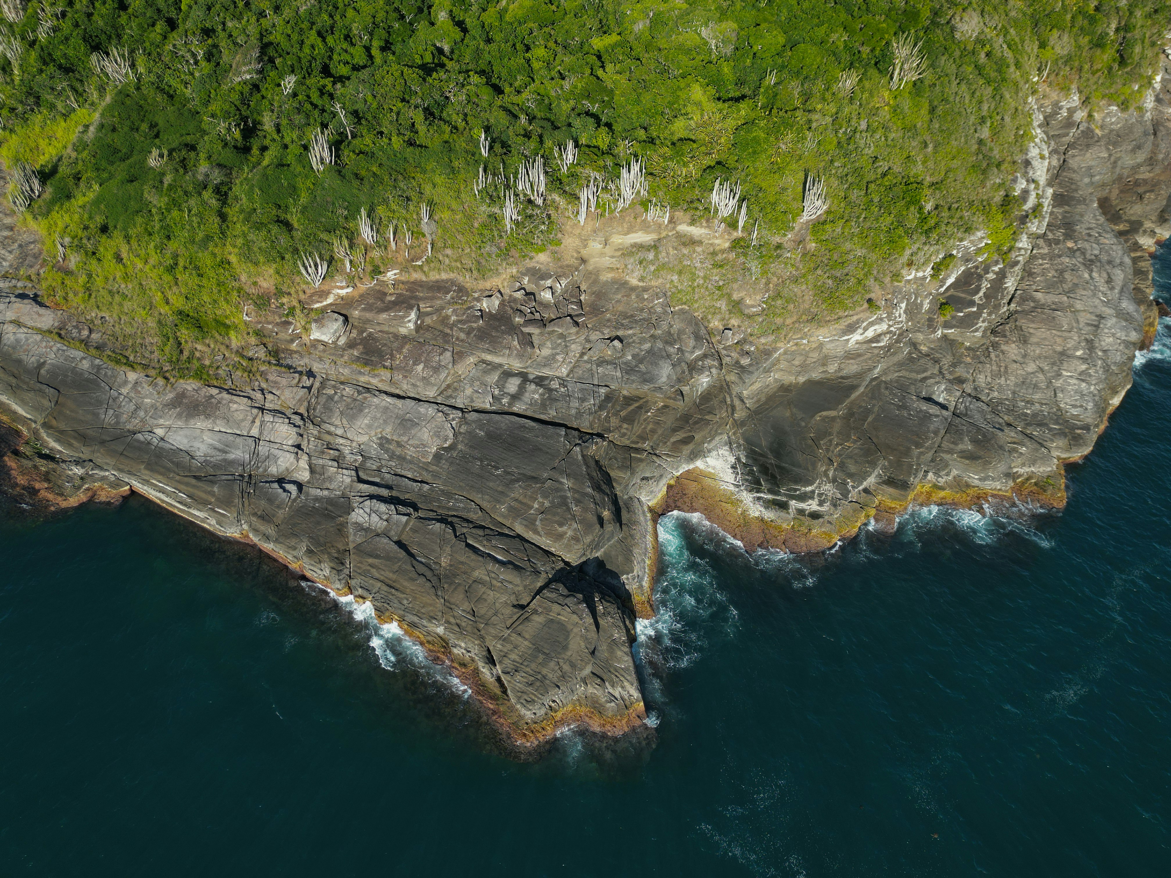 an aerial view of an island in the middle of the ocean