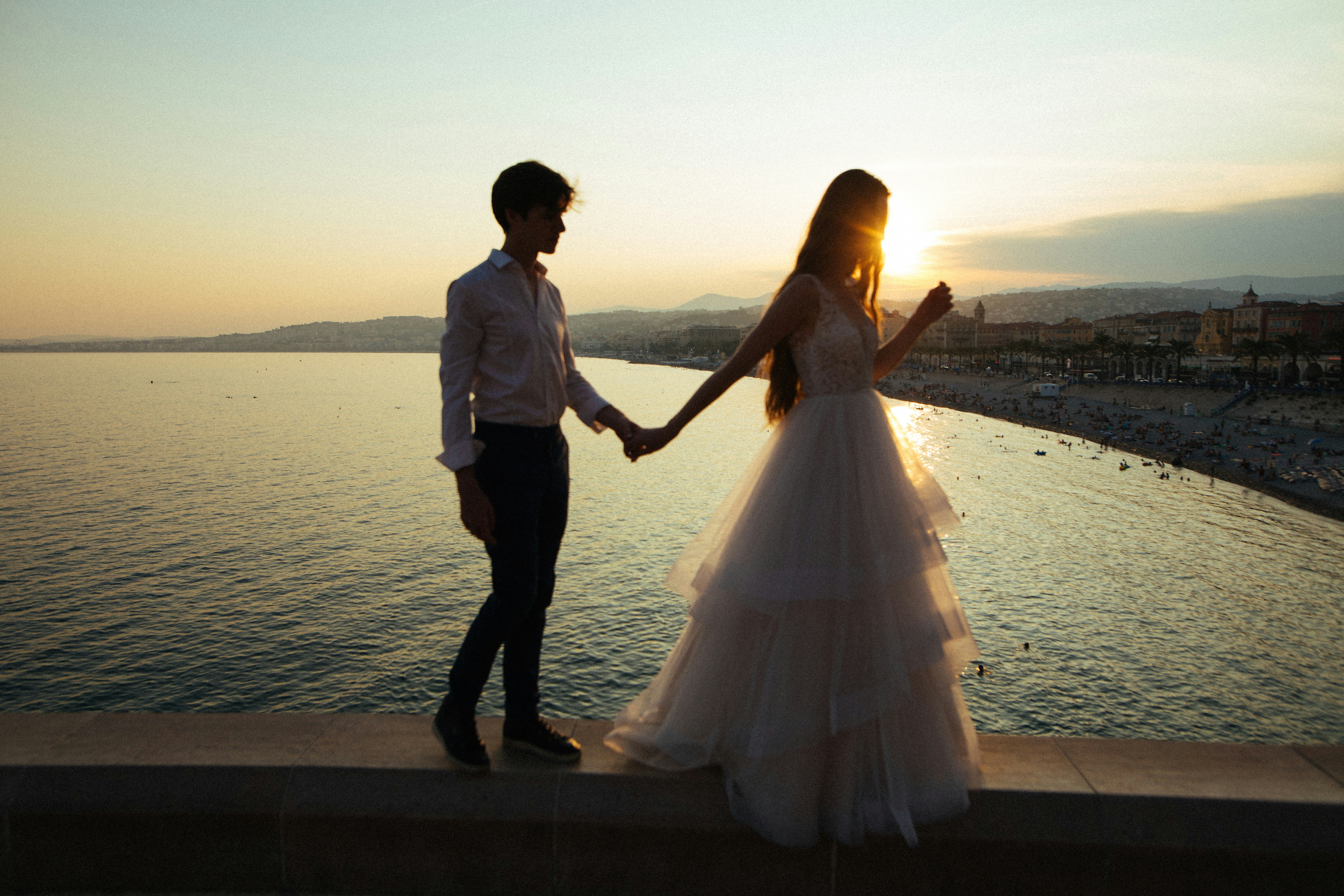 Sunlit Union: A Silhouette by the Sea