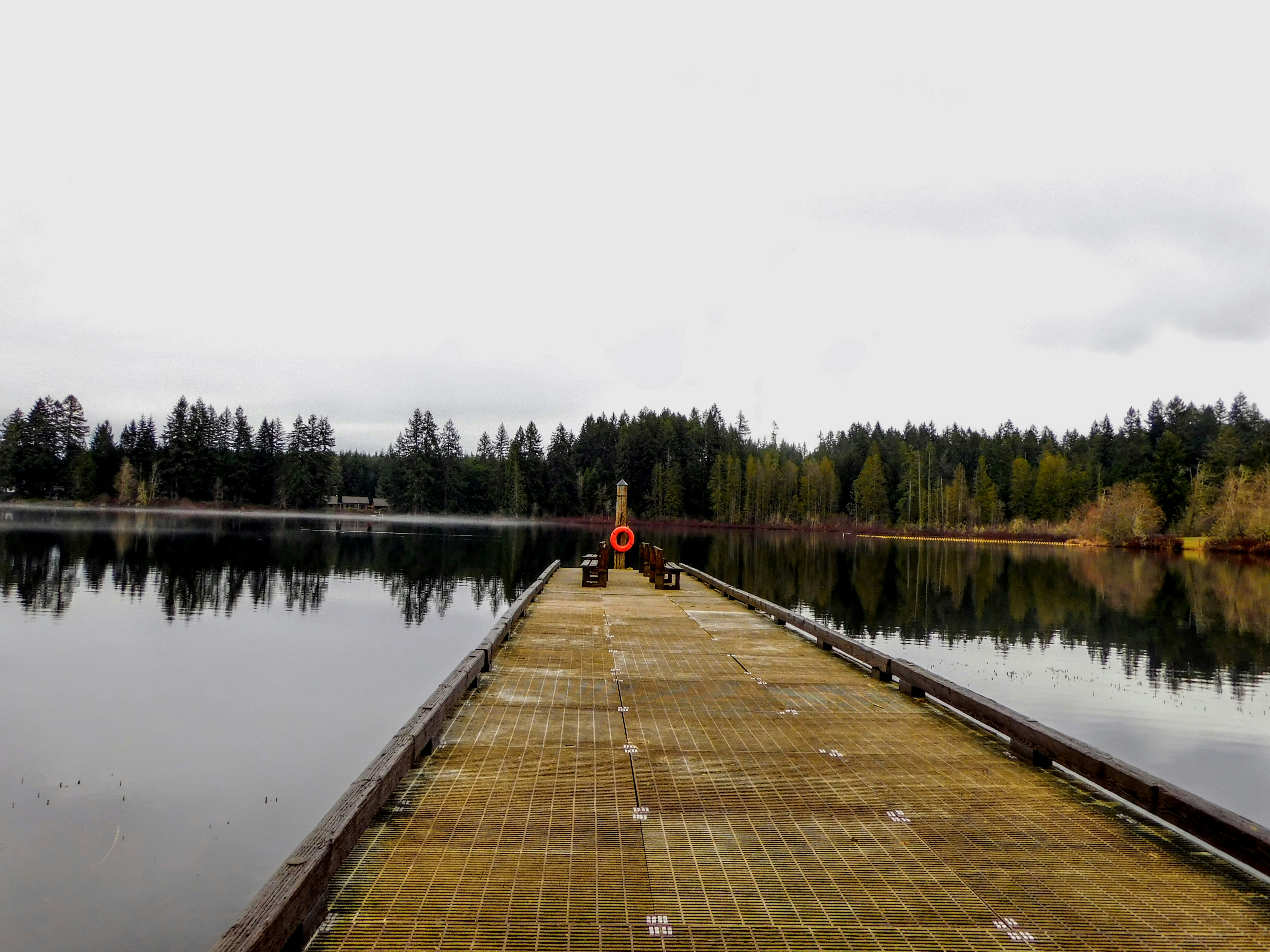 Red End of the Pier: Quiet Drama on a Still Lake