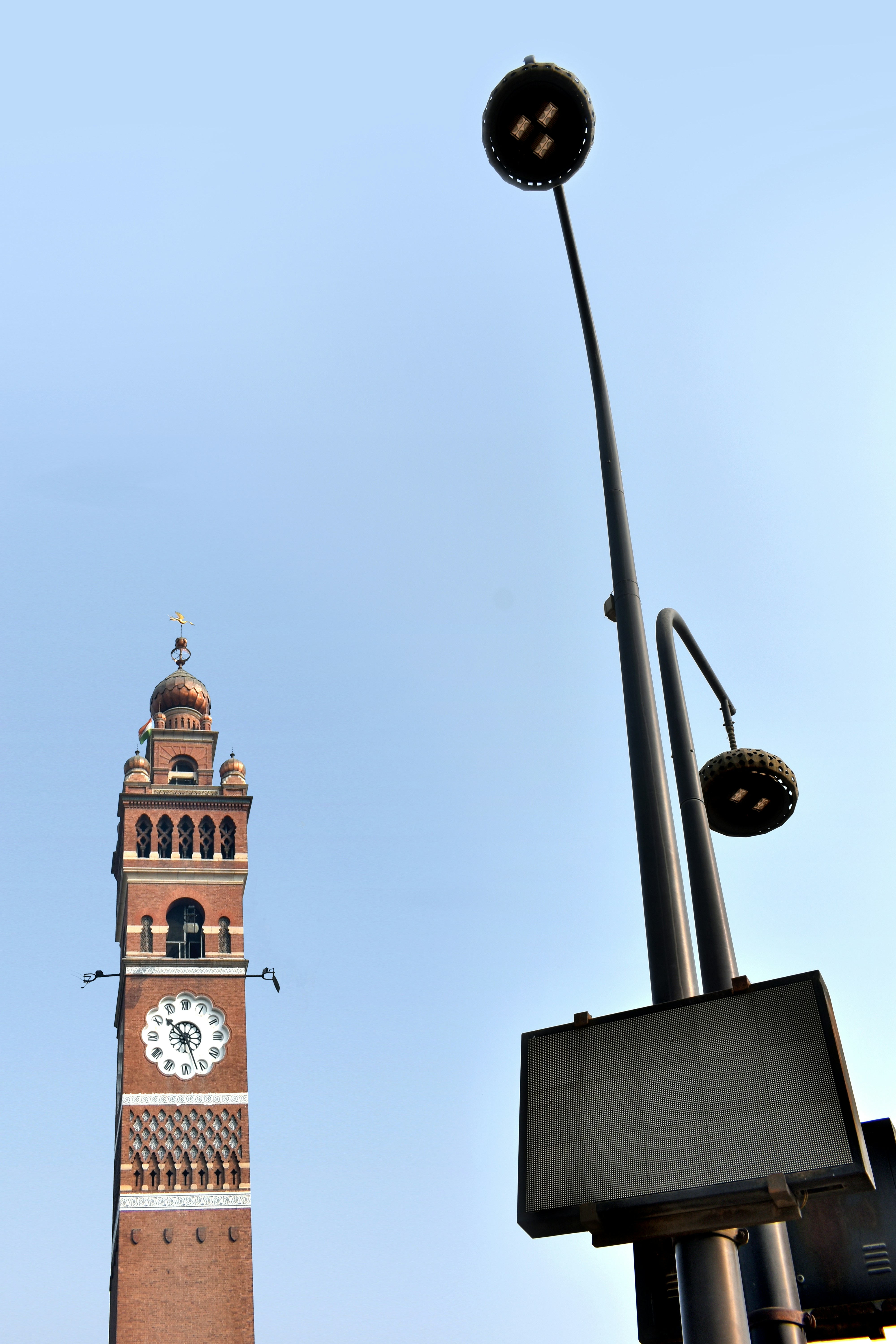 a tall clock tower towering over a city