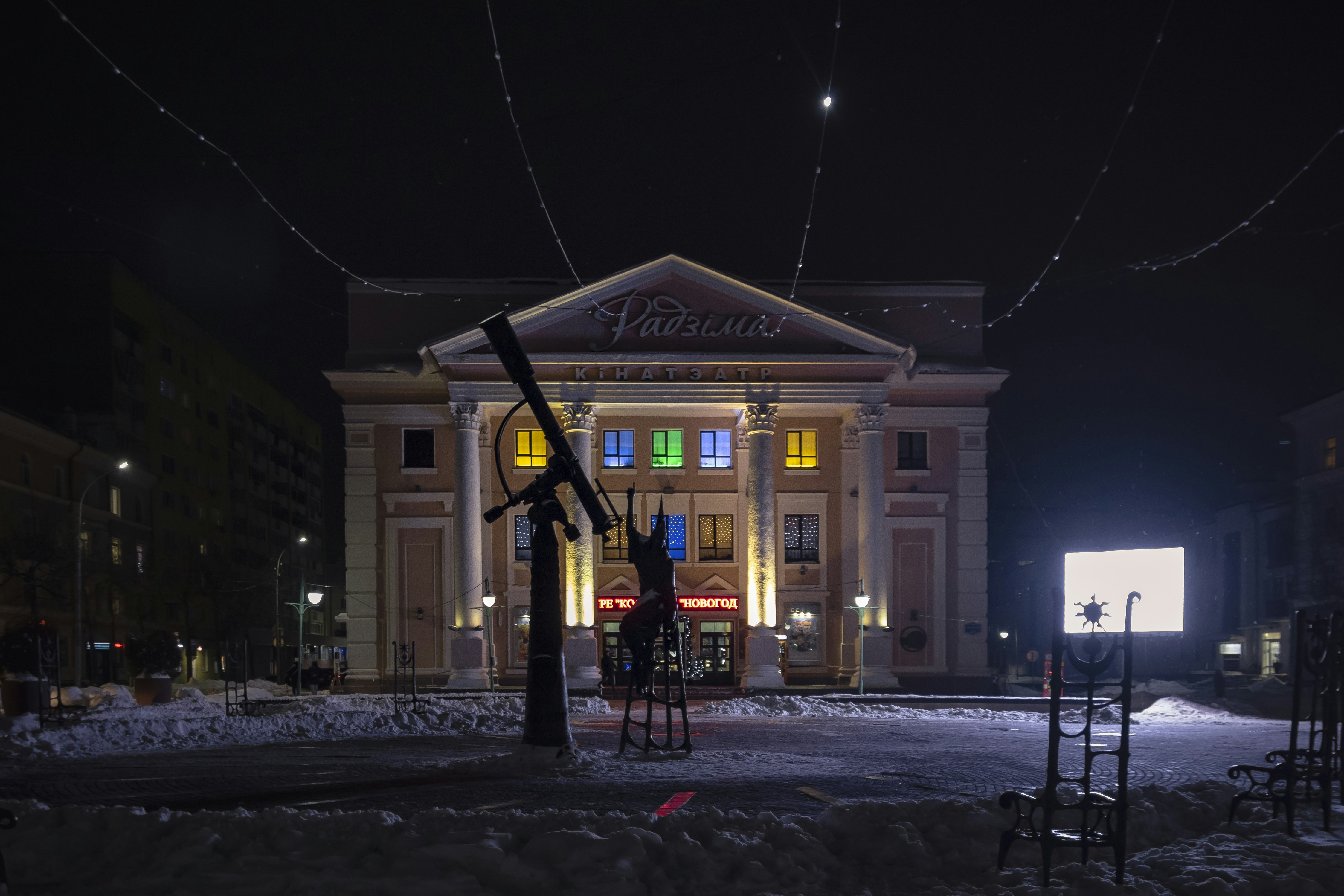 Snowy Night Shoot Before a Neo-Classical Theater Facade