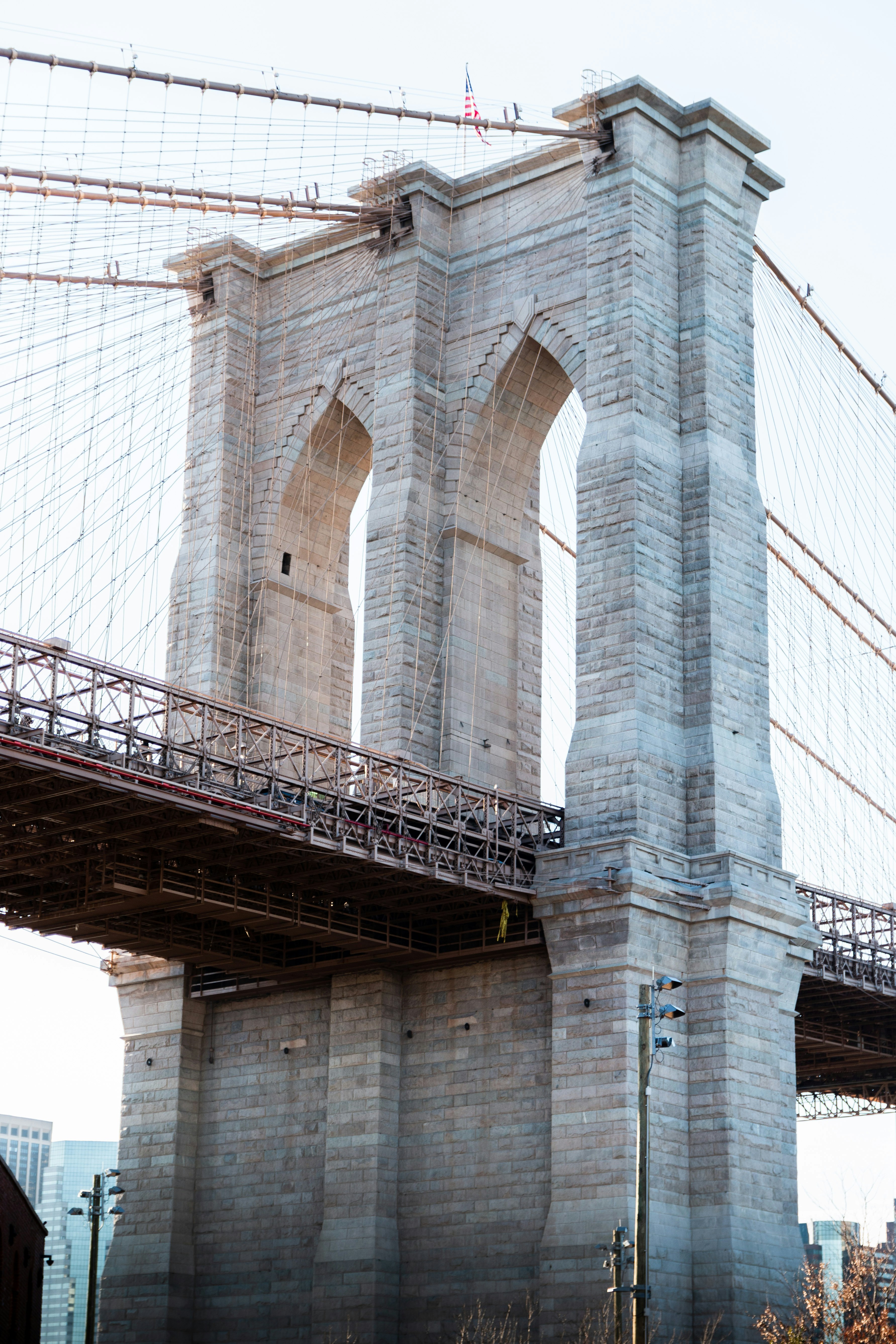 A tall bridge with a wire above it photo – Free New york Image on Unsplash