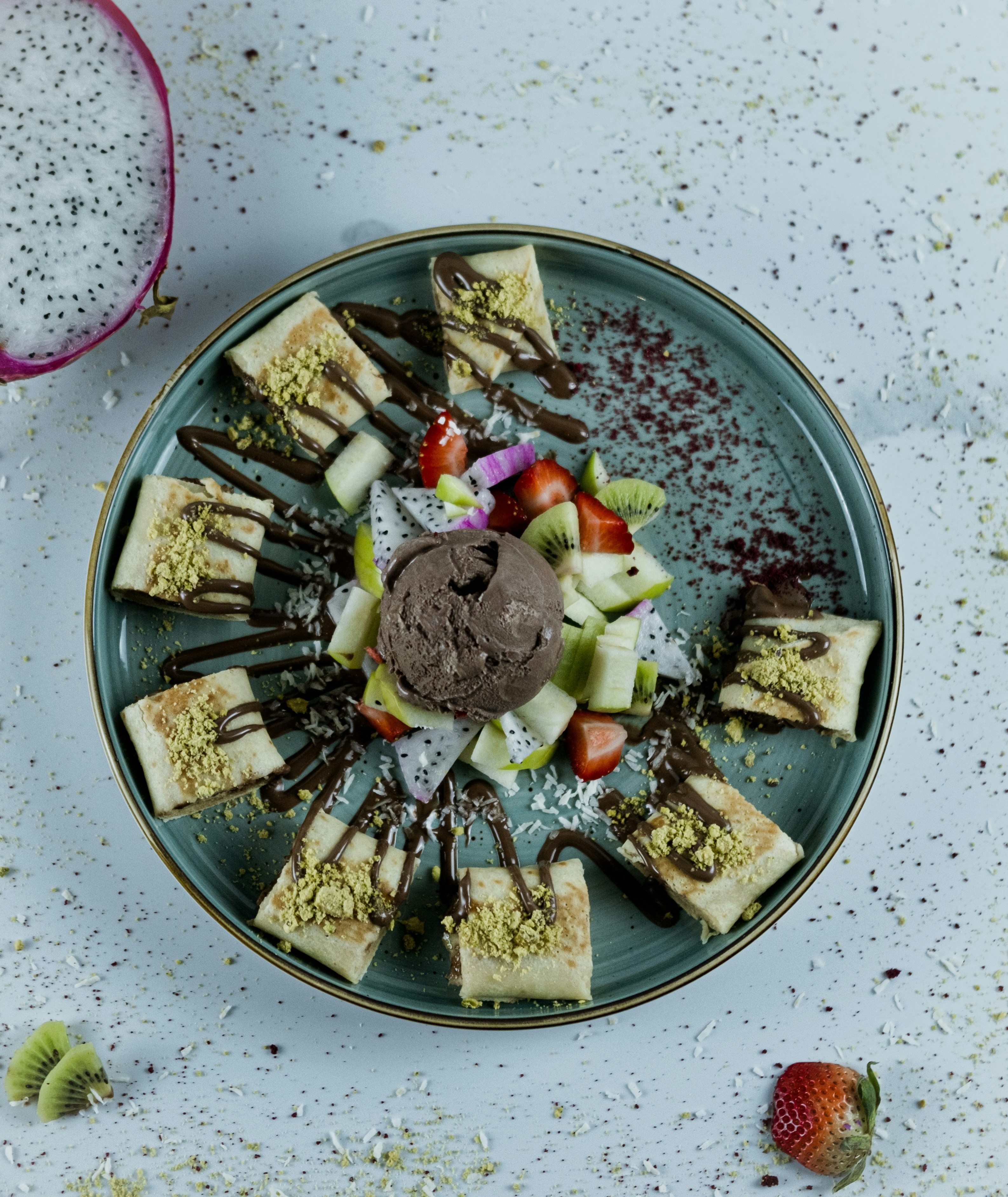 A plate of food on a table next to a glass of wine photo – Free Food ...