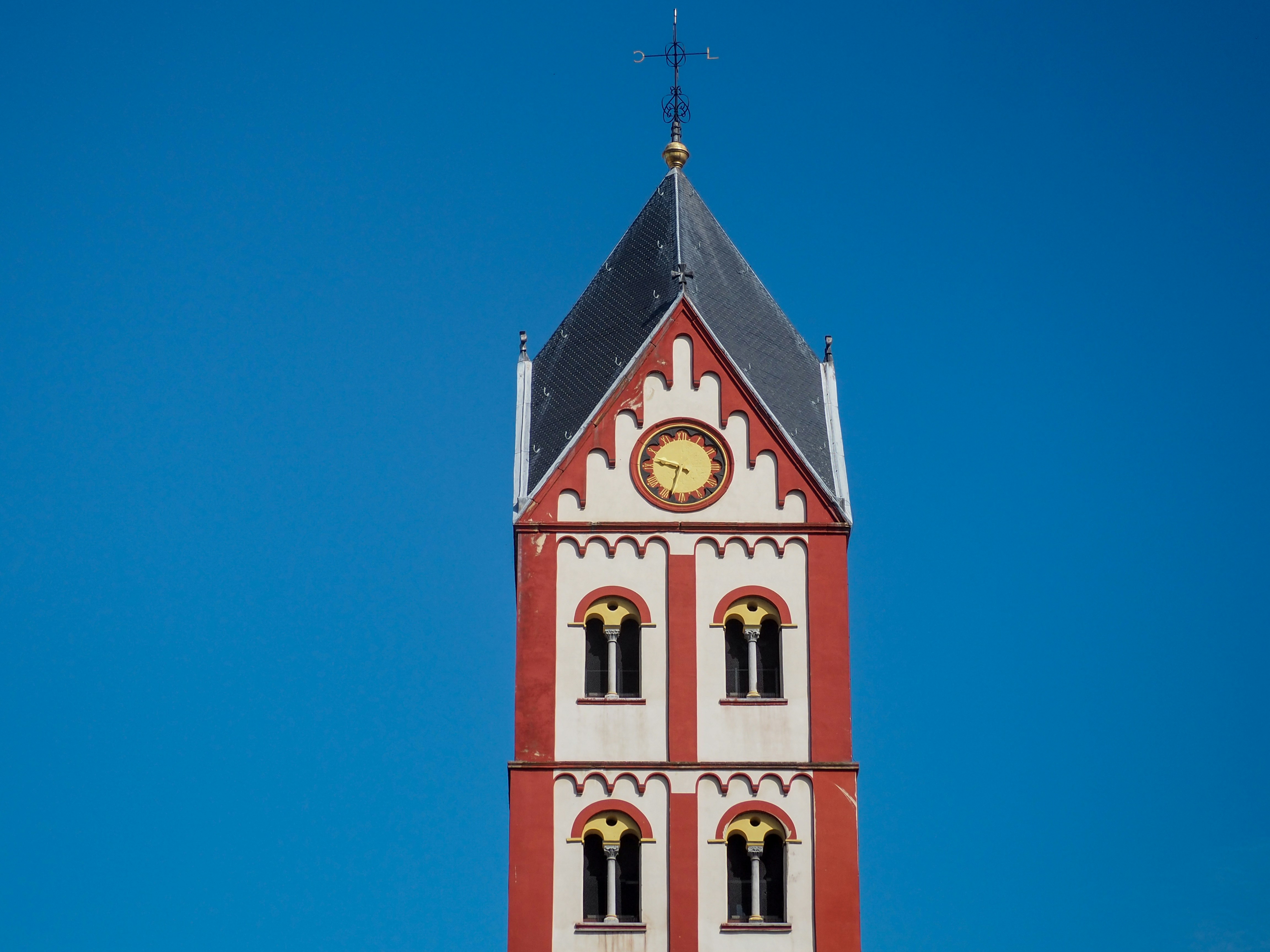 A tall clock tower with a clock on each of it's sides photo – Free City ...