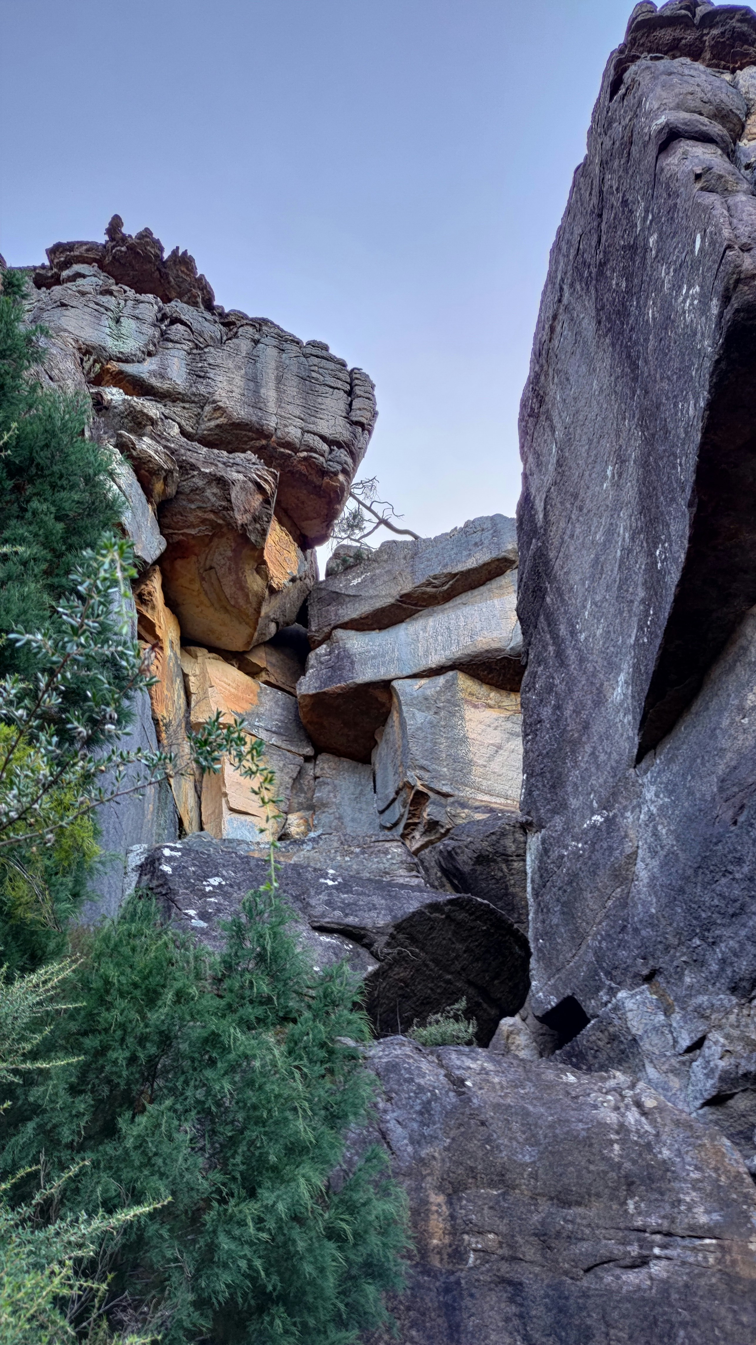 Layered Giants: A Vertical Canyon of Stacked Boulders