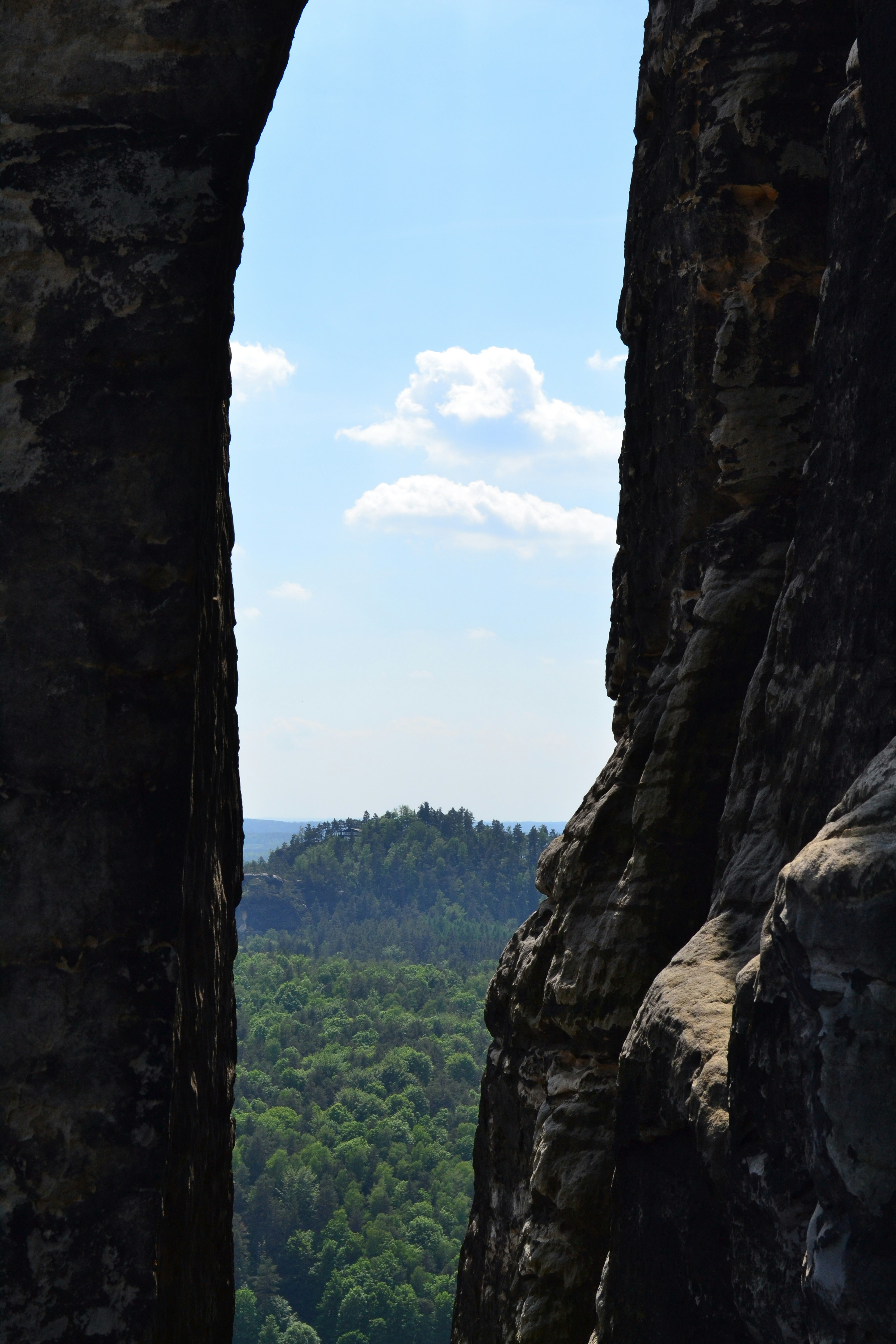 A view of a valley through a stone arch photo – Free Germany Image on ...