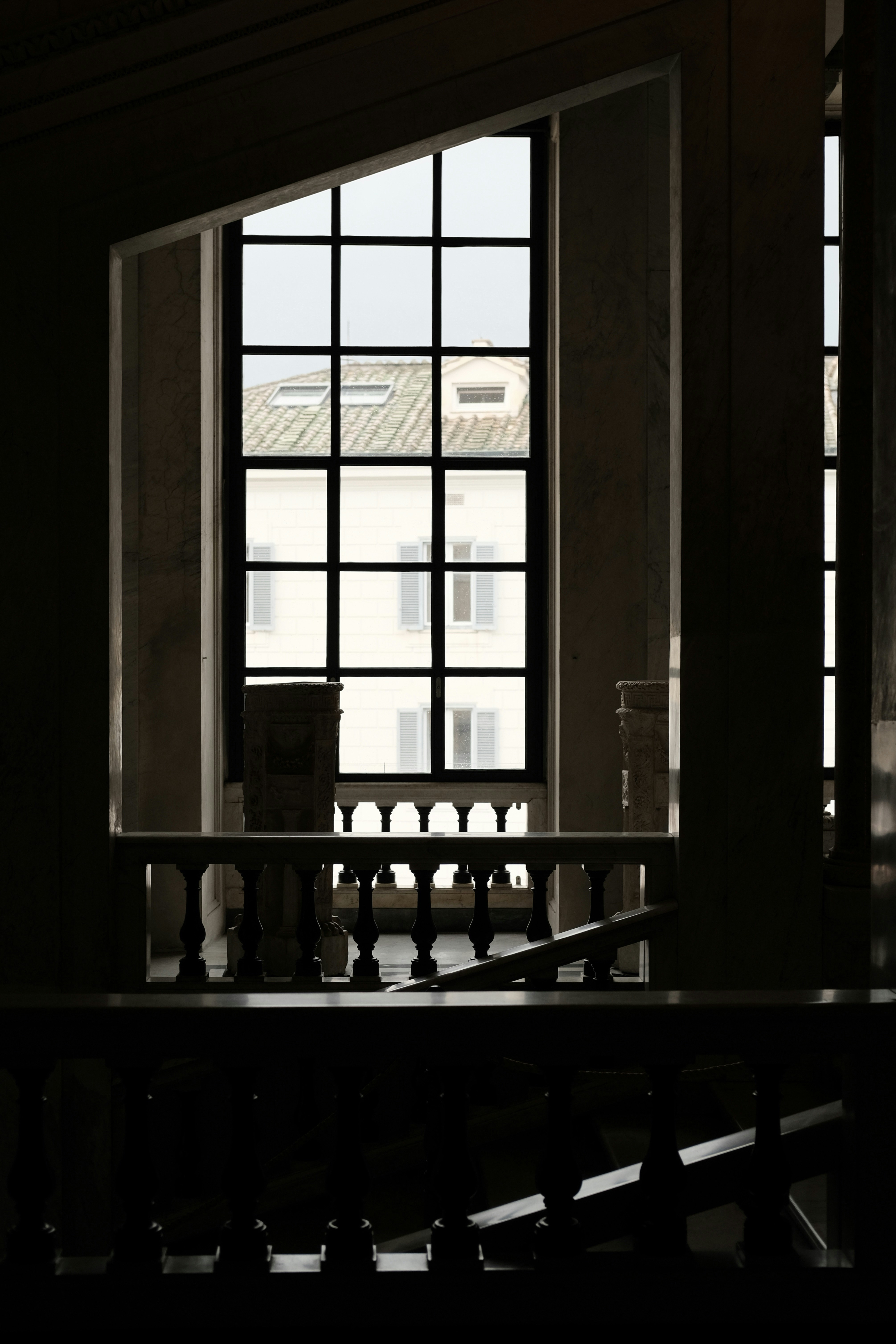 A view of a building through a window photo – Free Building Image on ...