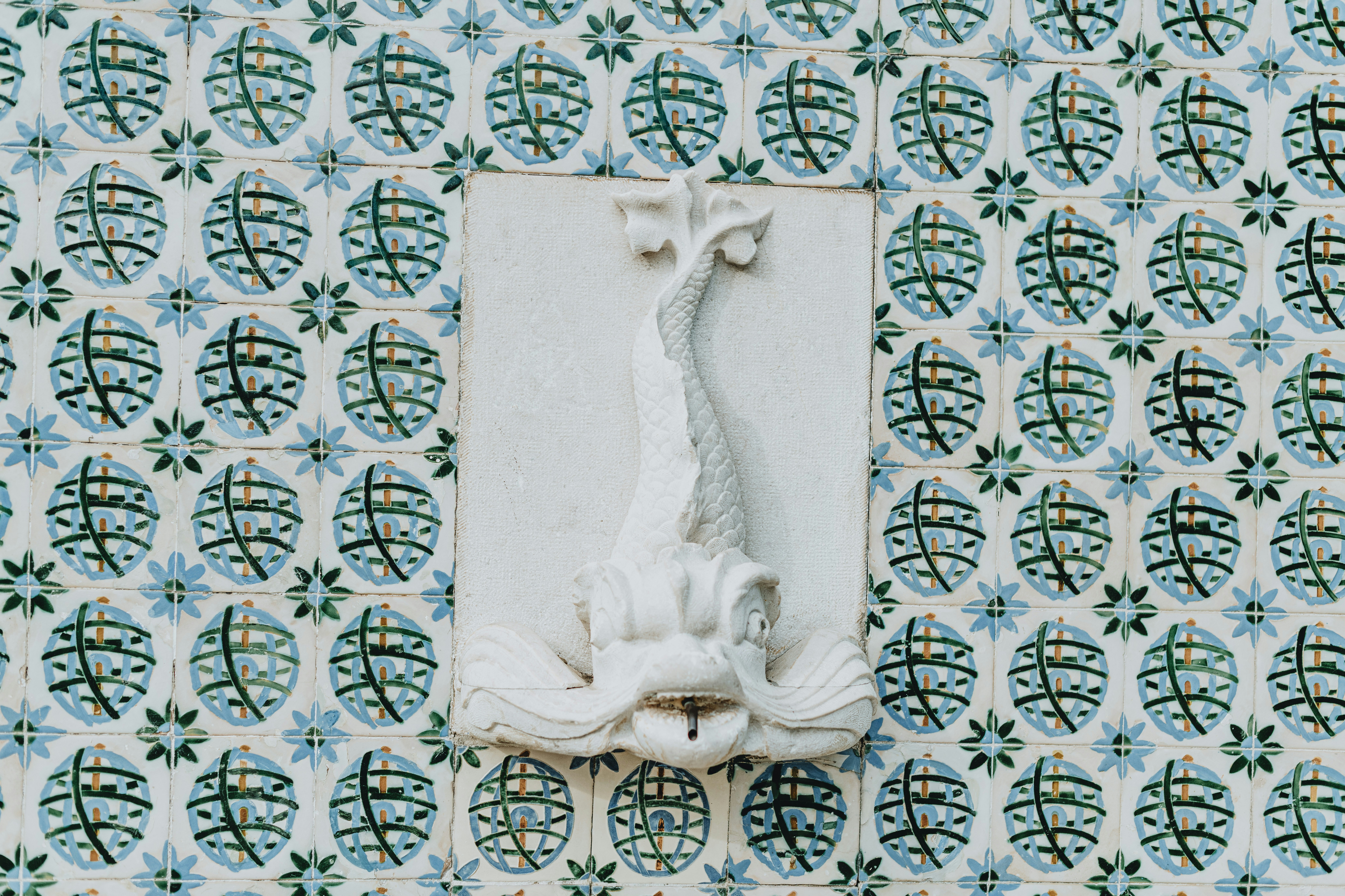 Sculpted Niche Quietly Framed by Geometric Tiles