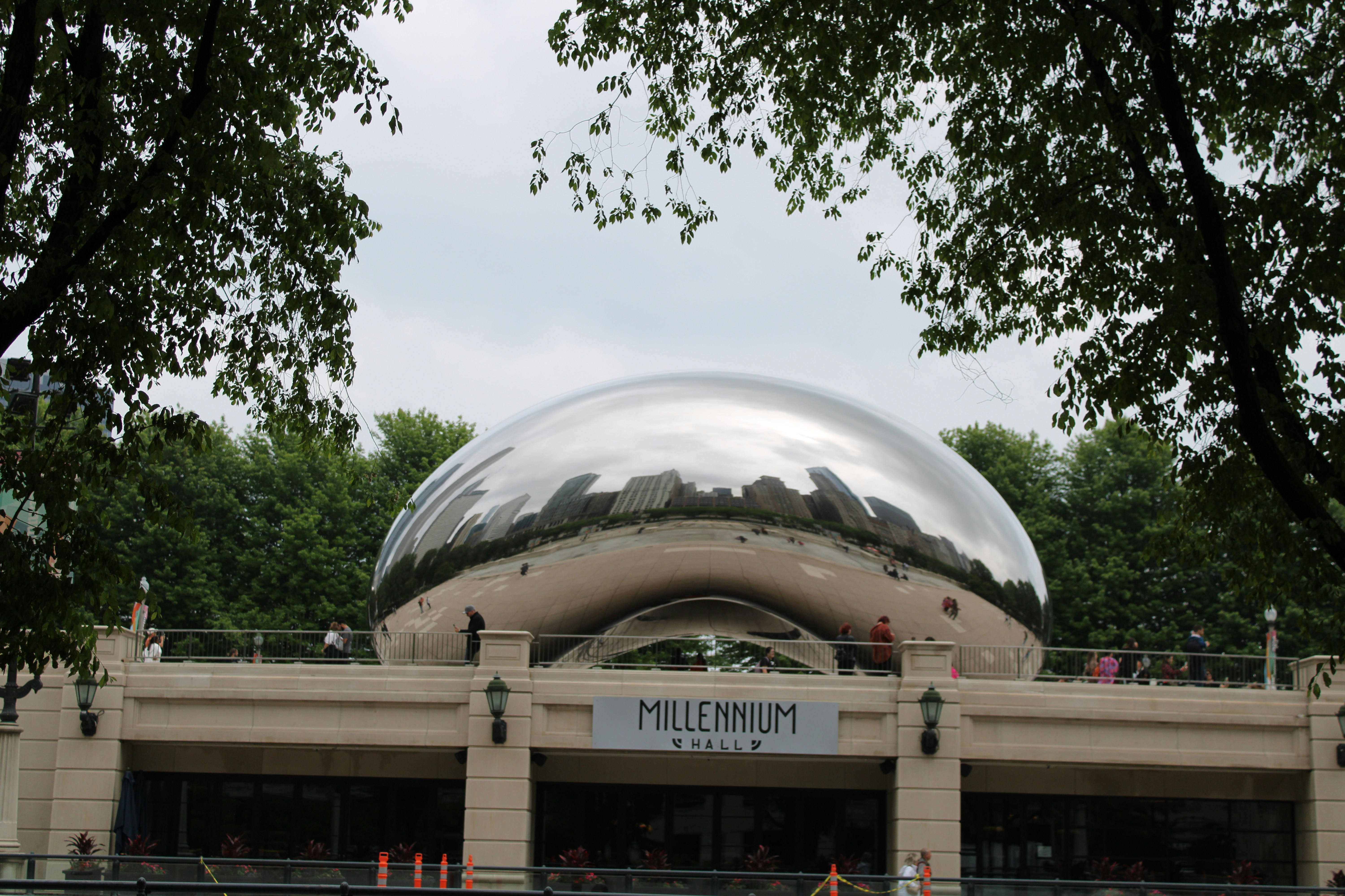 A large metal ball sitting on top of a building photo – Free Chicago ...