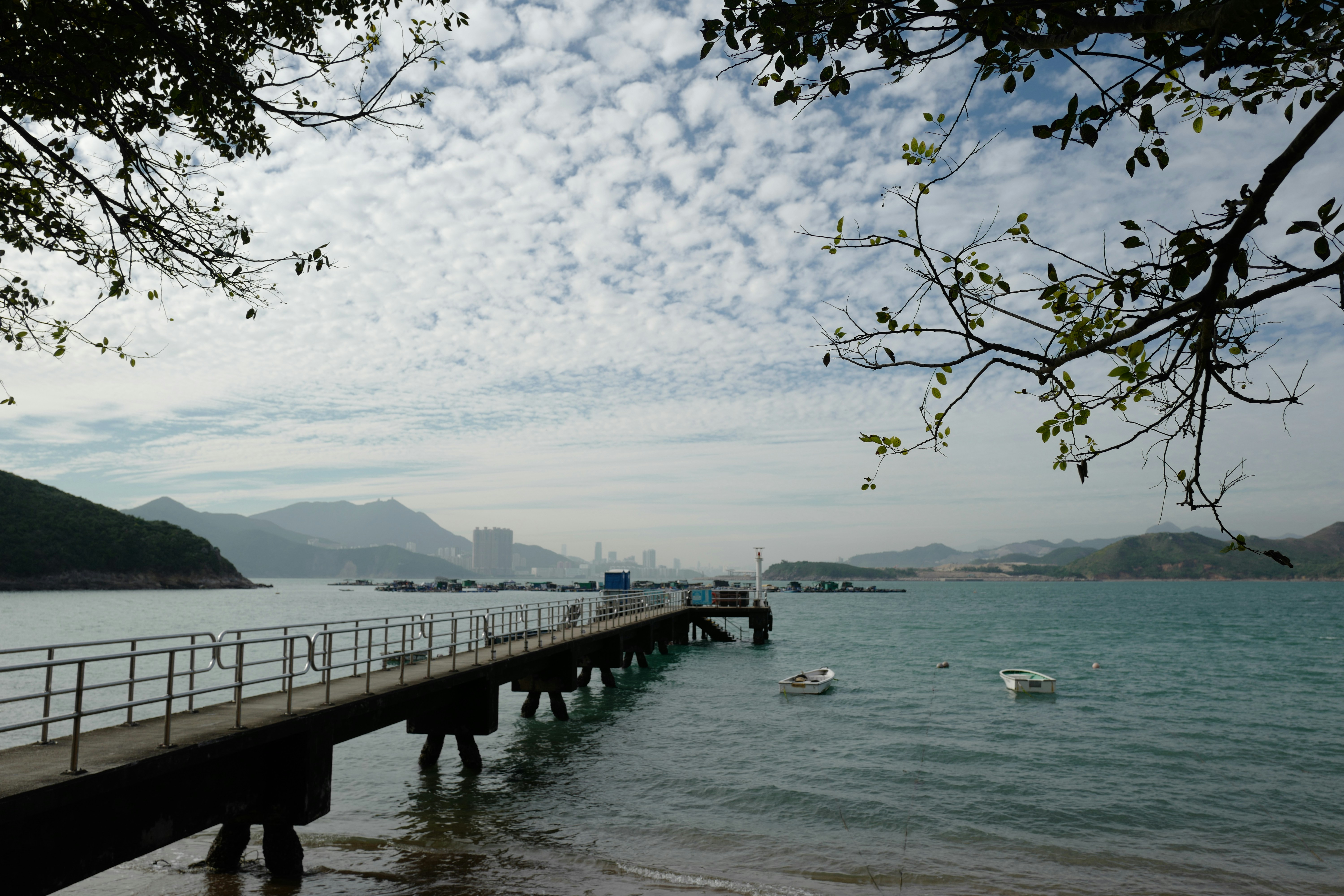 An island dock off the bay in Hong Kong on an overcast day