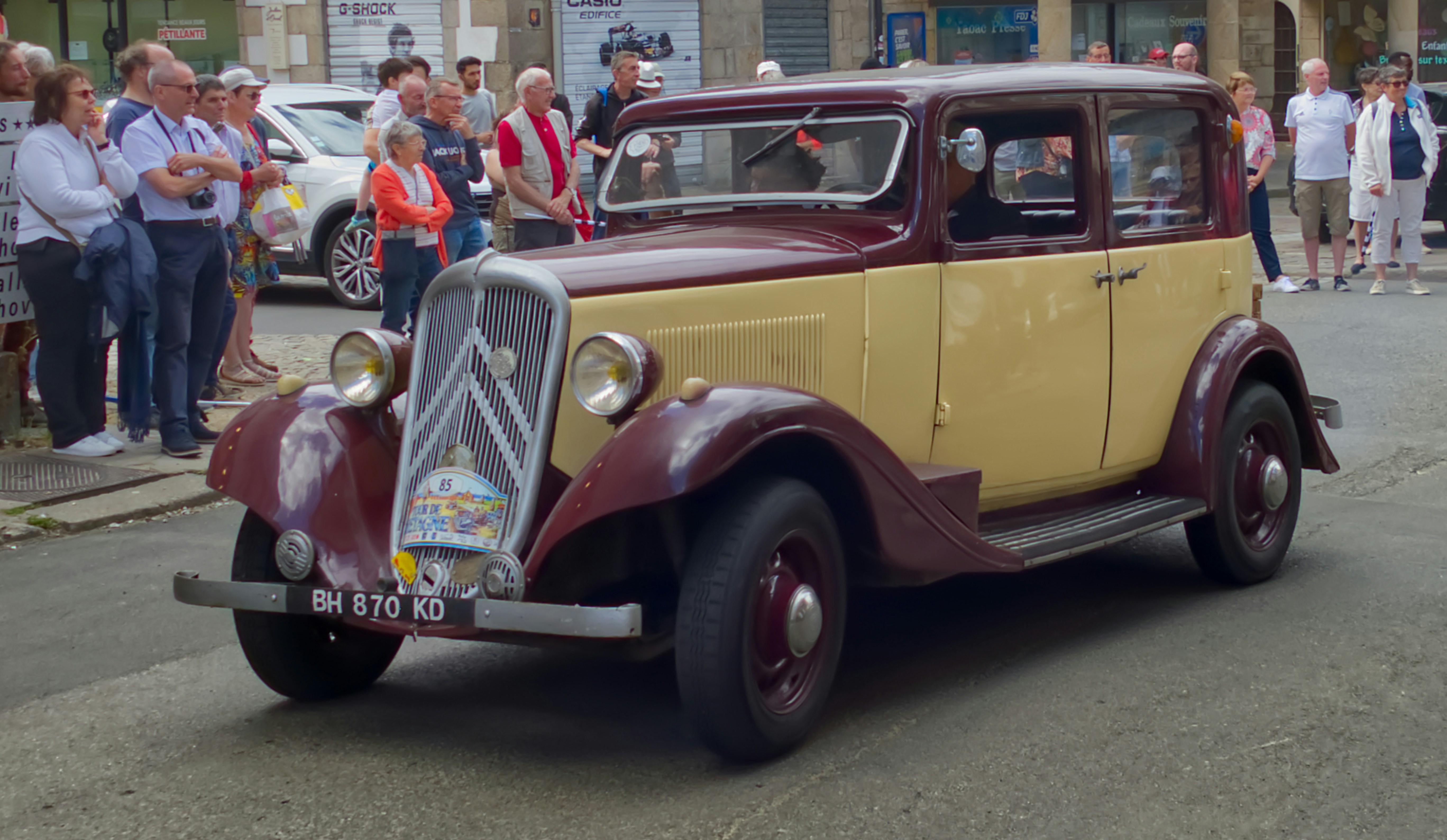 Maroon-and-cream Classic Car Parade Brilliance