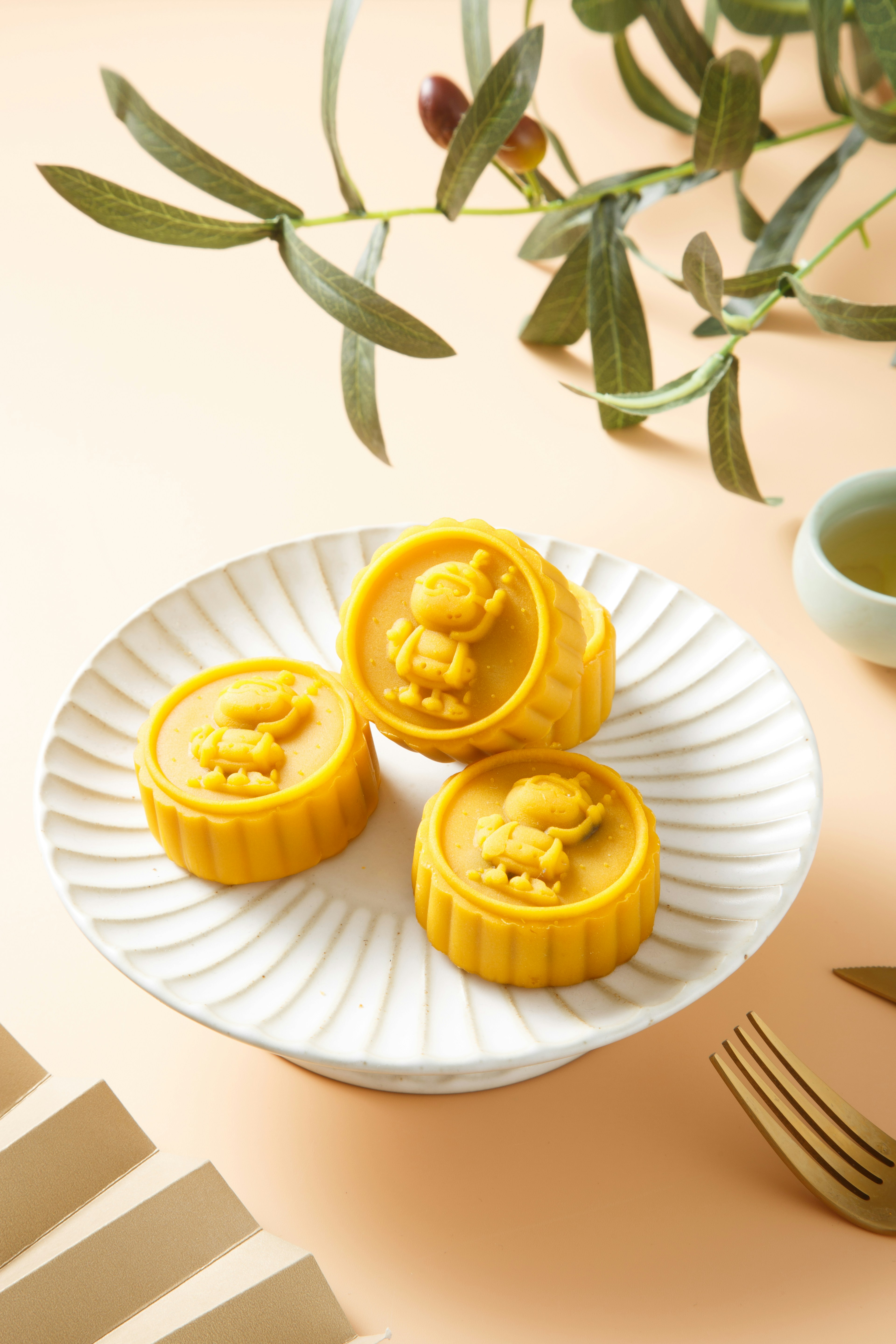 A white plate topped with cut up food on top of a table photo – Free ...