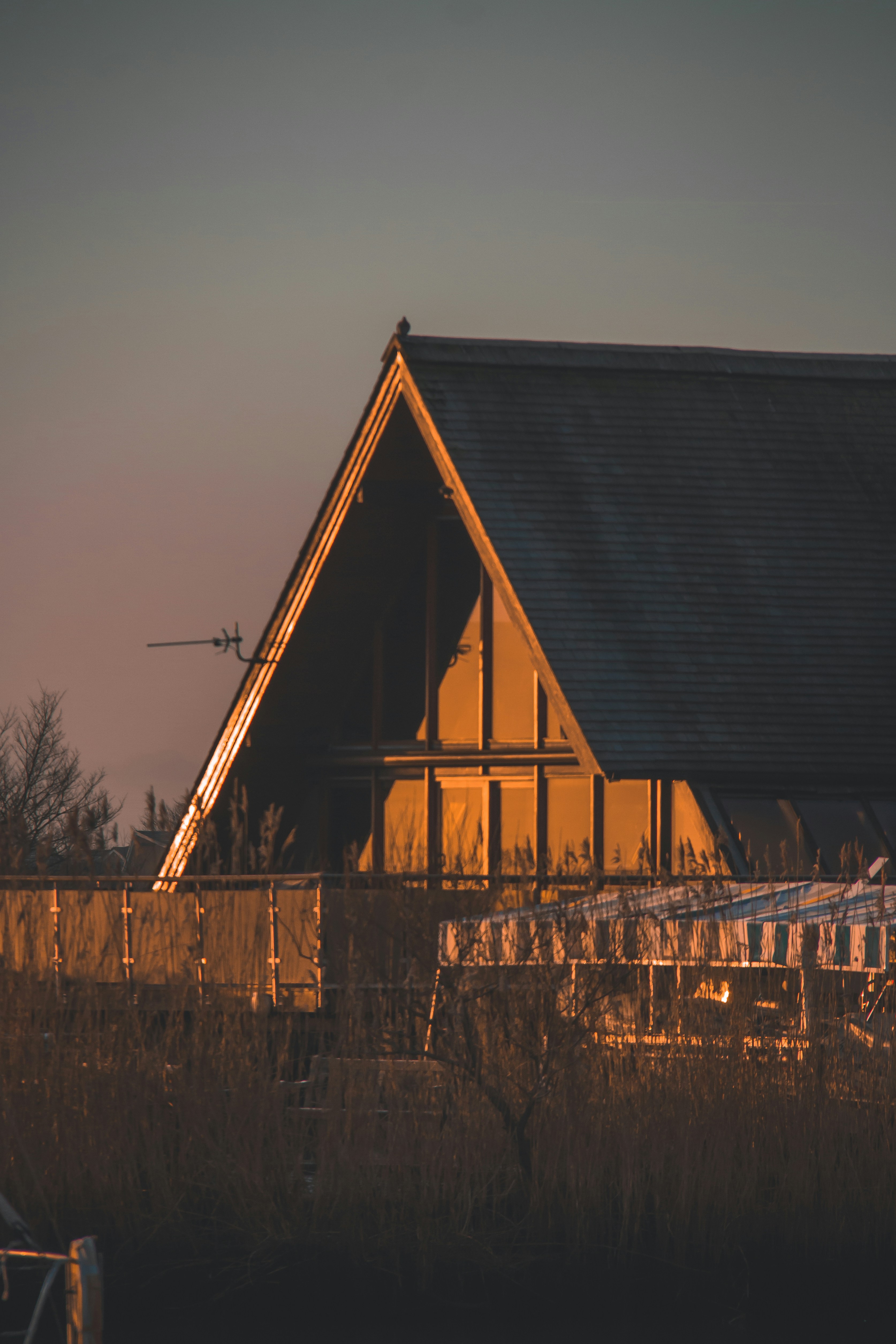 Dusk Ember A-frame: Warm Geometry Illuminates a Quiet Structure