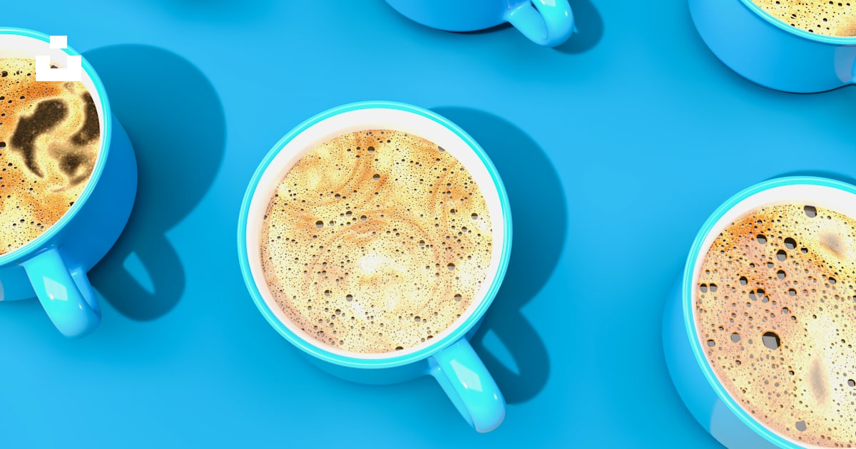 Un Groupe De Tasses à Café Assises Sur Une Table Bleue Photo Photo 3d
