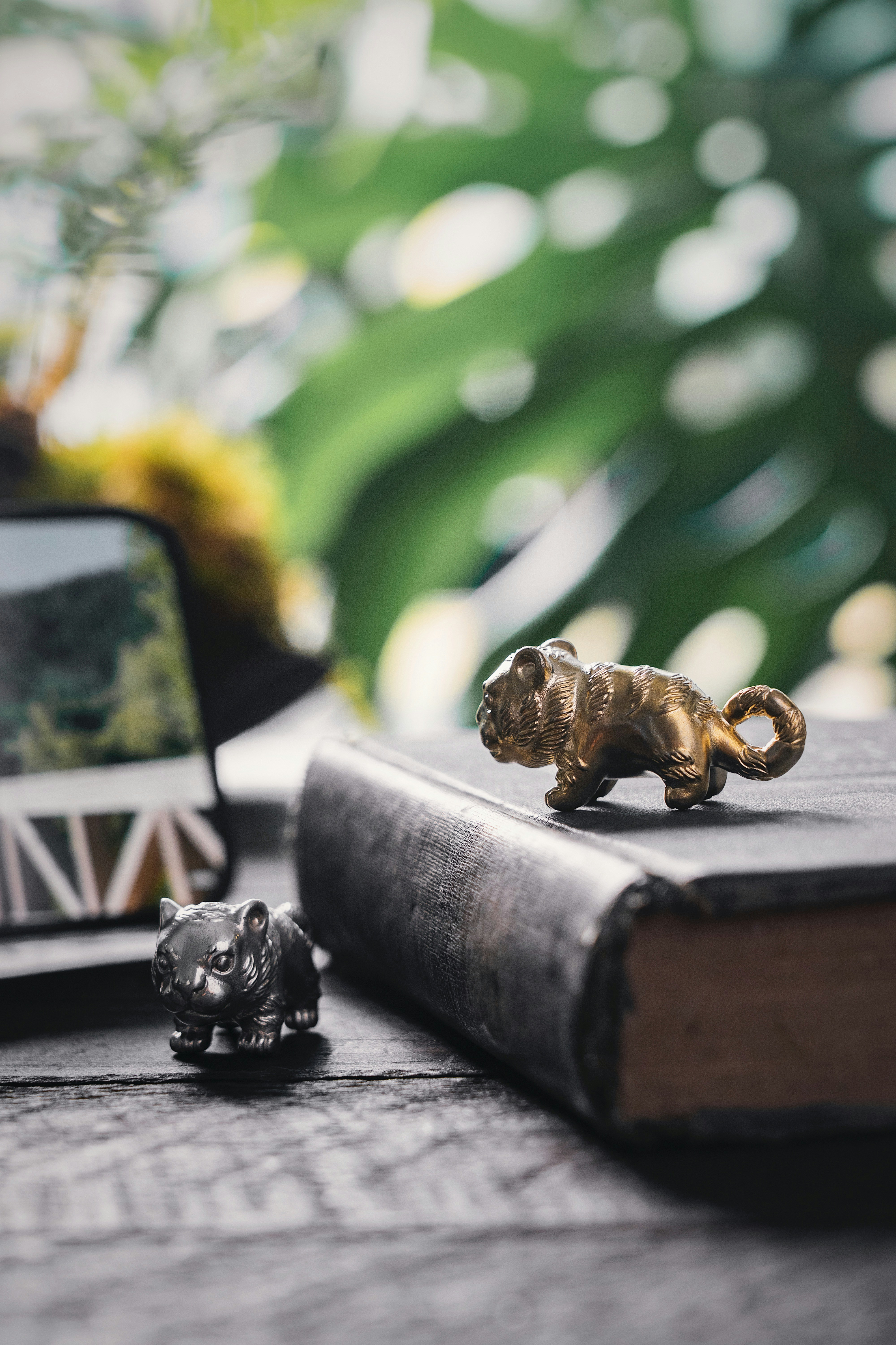 Tiny Brass Tiger on a Studious Table: A Quiet Still Life