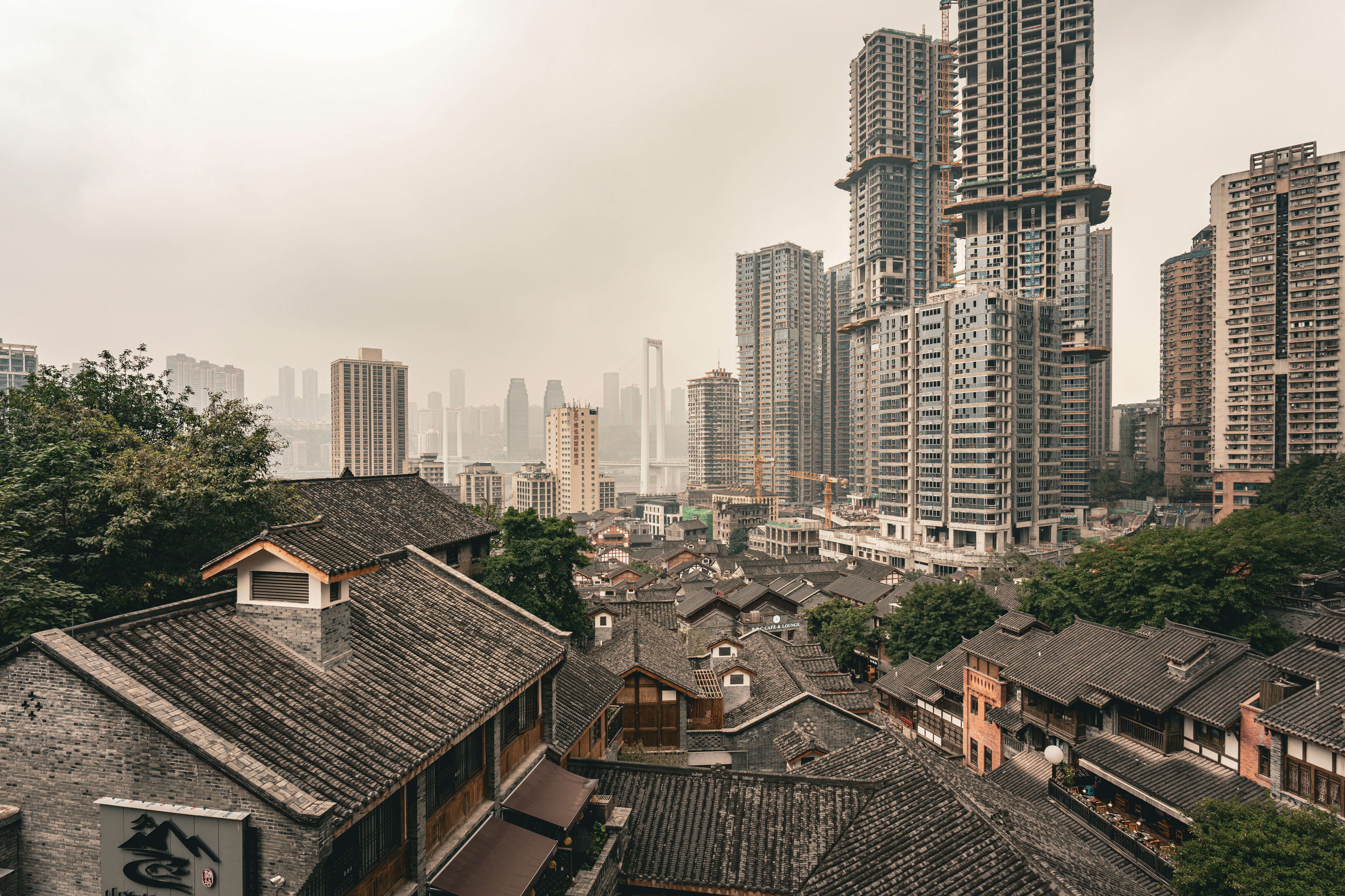 A view of a city with tall buildings photo – Free Chongqing Image on ...
