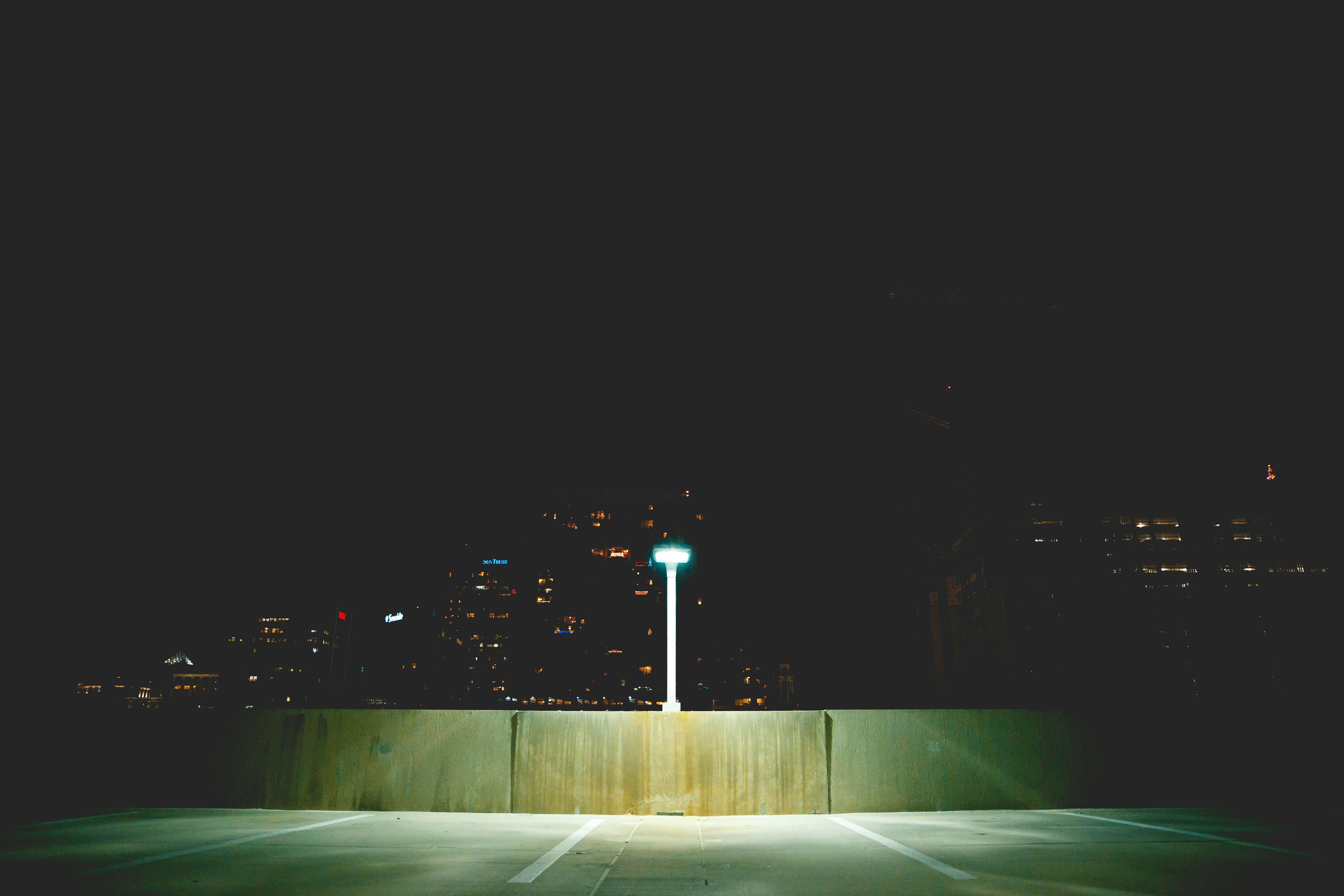 An empty parking lot at night with a street light photo – Free Orlando ...