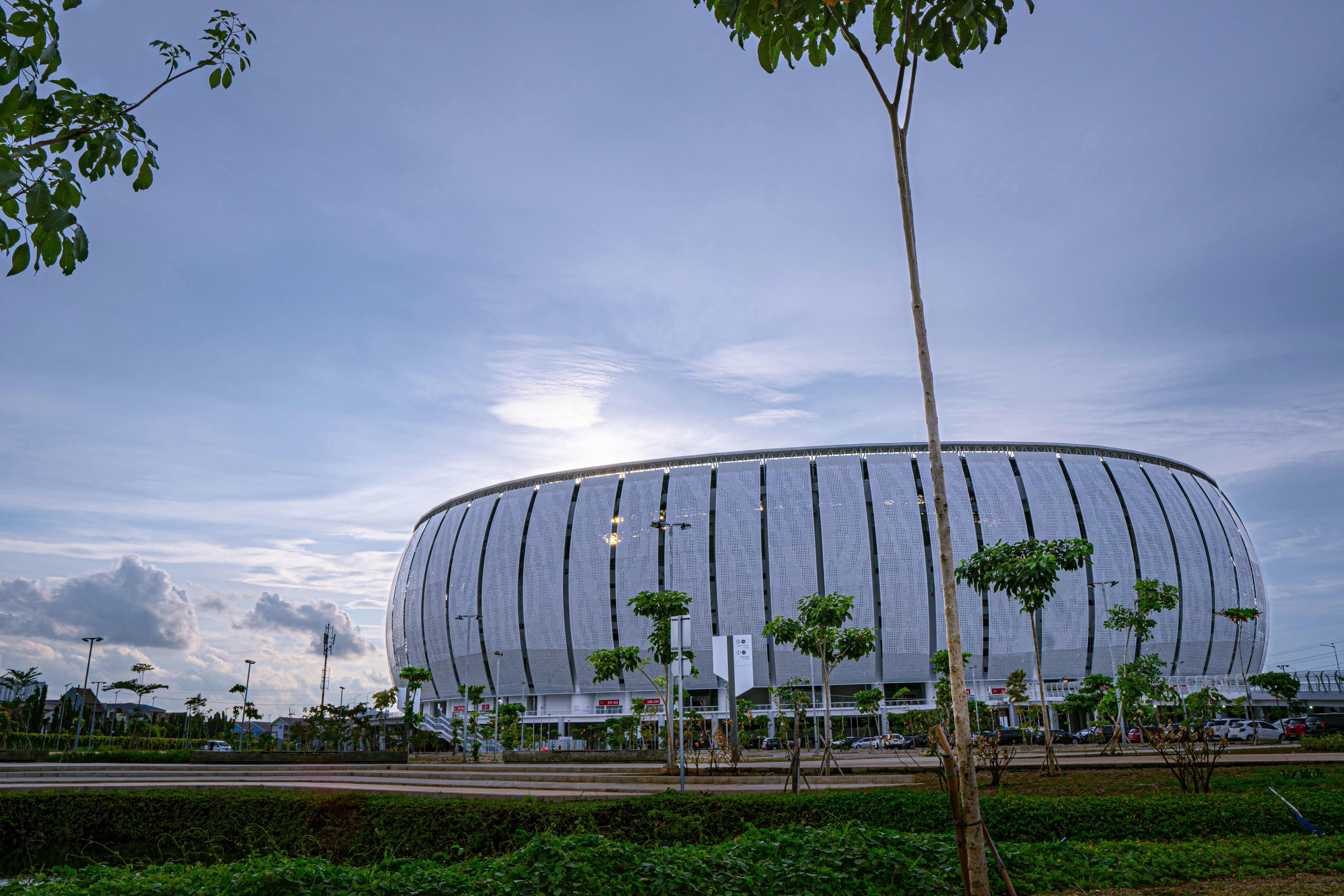 A large building with a large glass front photo – Free Jakarta Image on ...