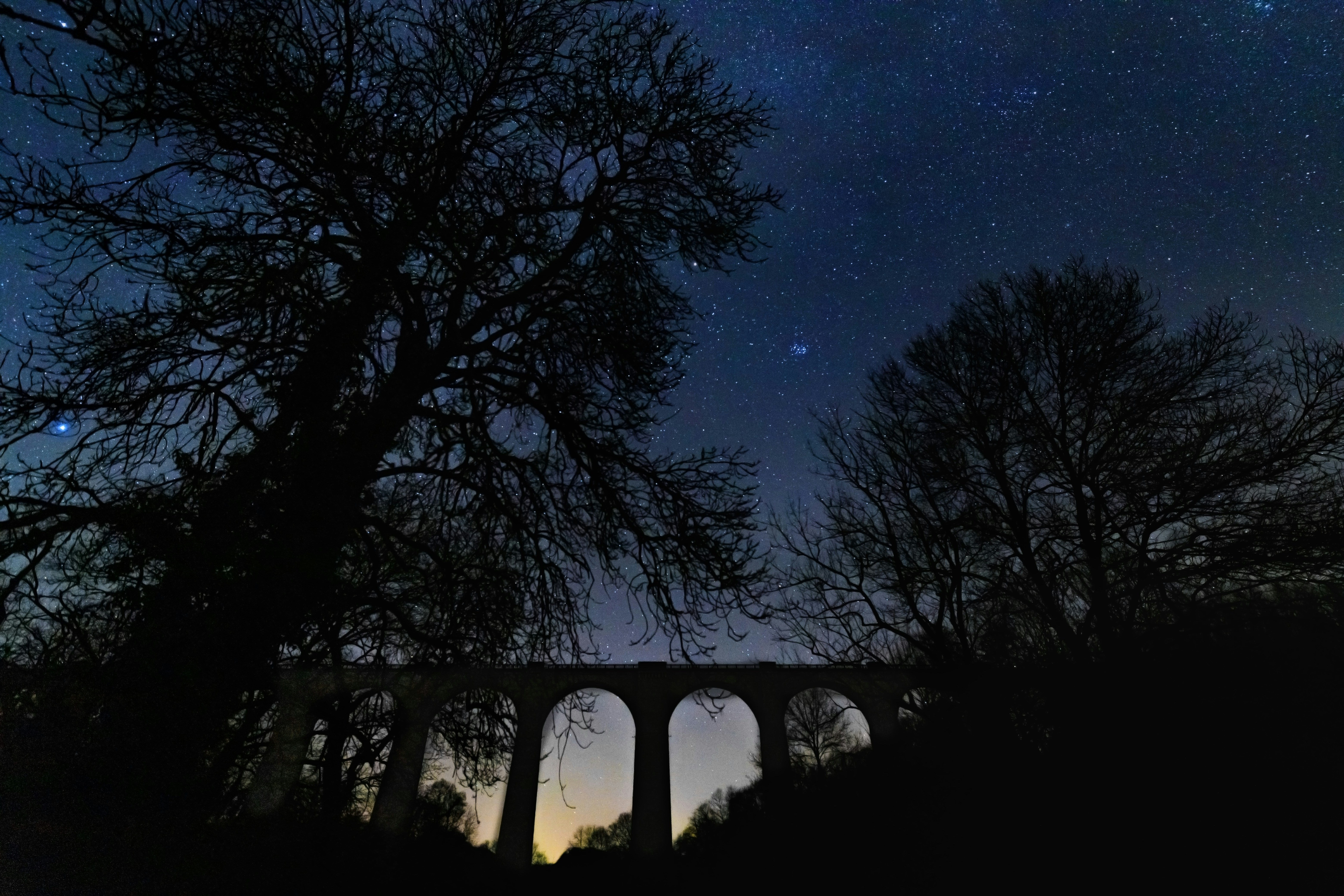 Night Viaduct Under a Starry Sky