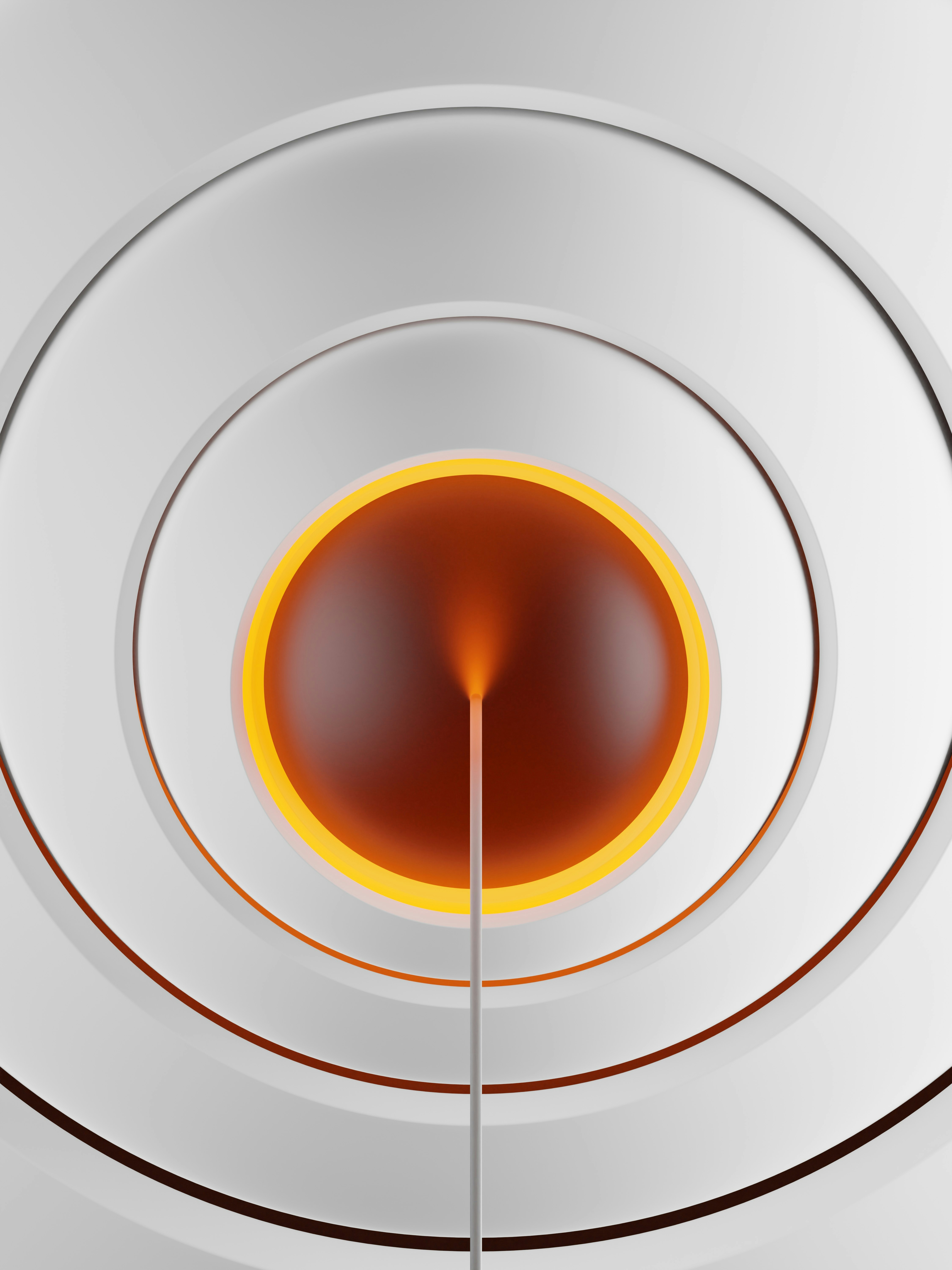 Un gros plan d’un objet rond avec une lumière à l’intérieur photo ...