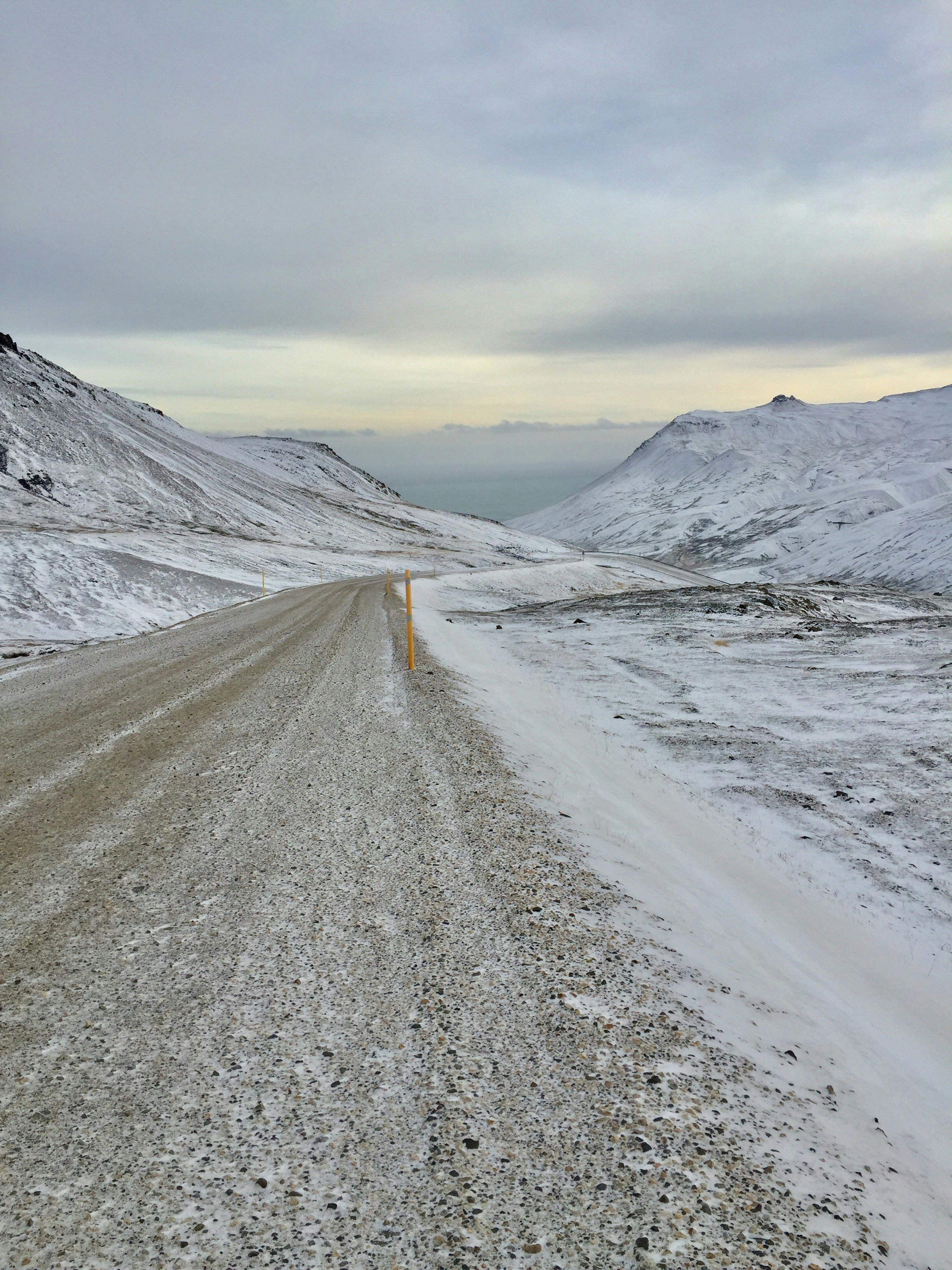 Snowbound Road Toward a Pale Horizon