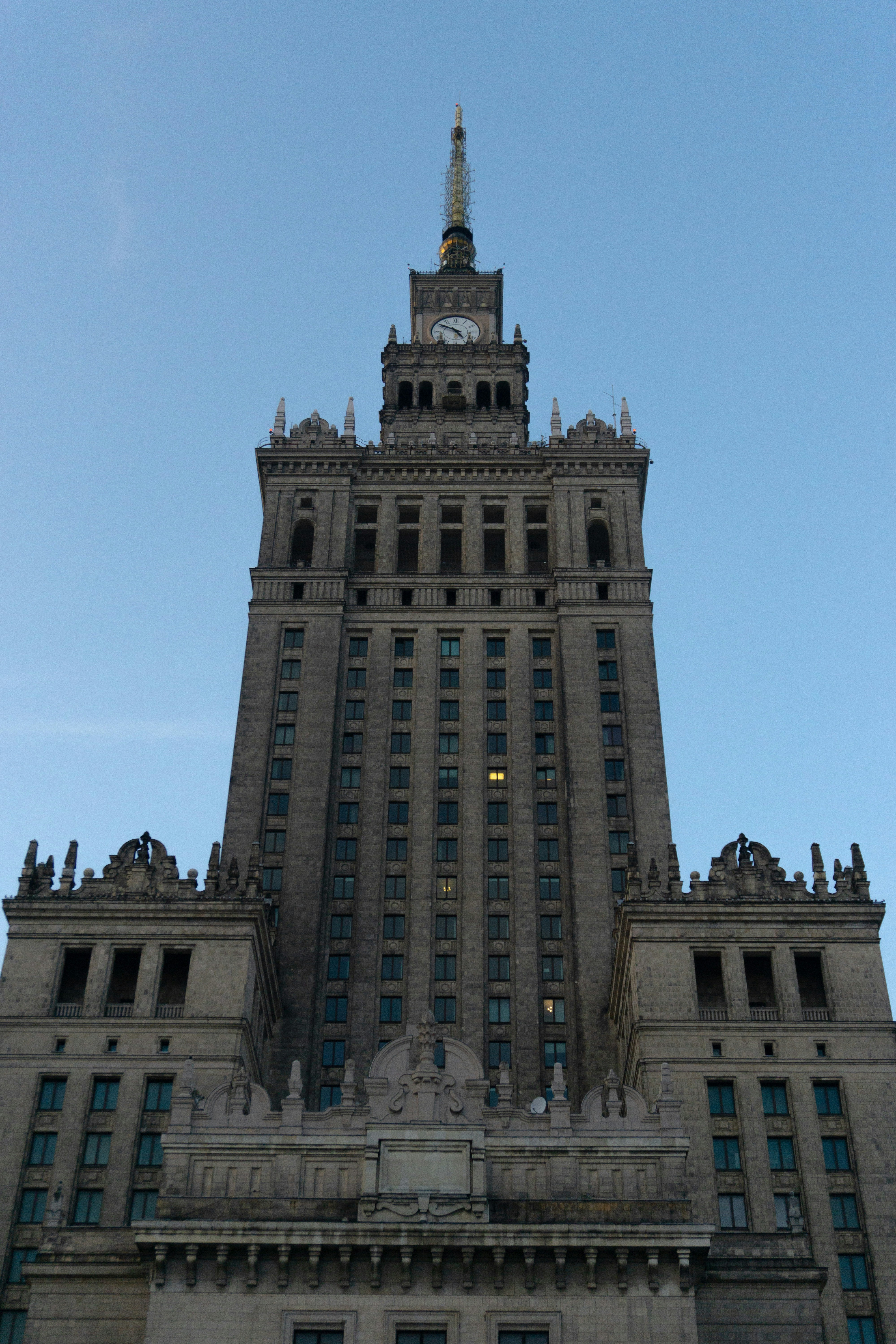 a tall building with a clock on the top of itYvonne Einerhand