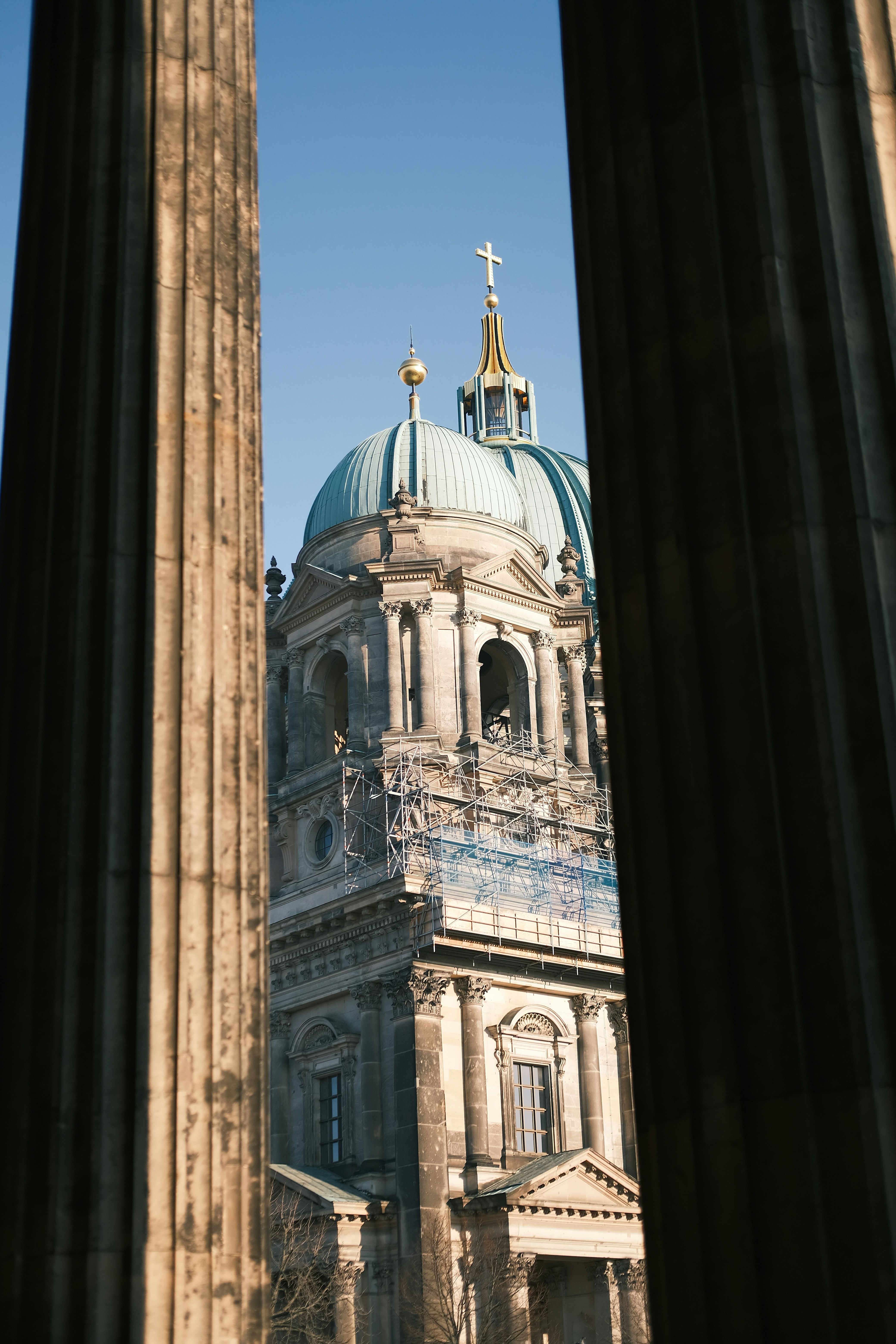 Between Giants: Cathedral Dome Framed by Monumental Columns