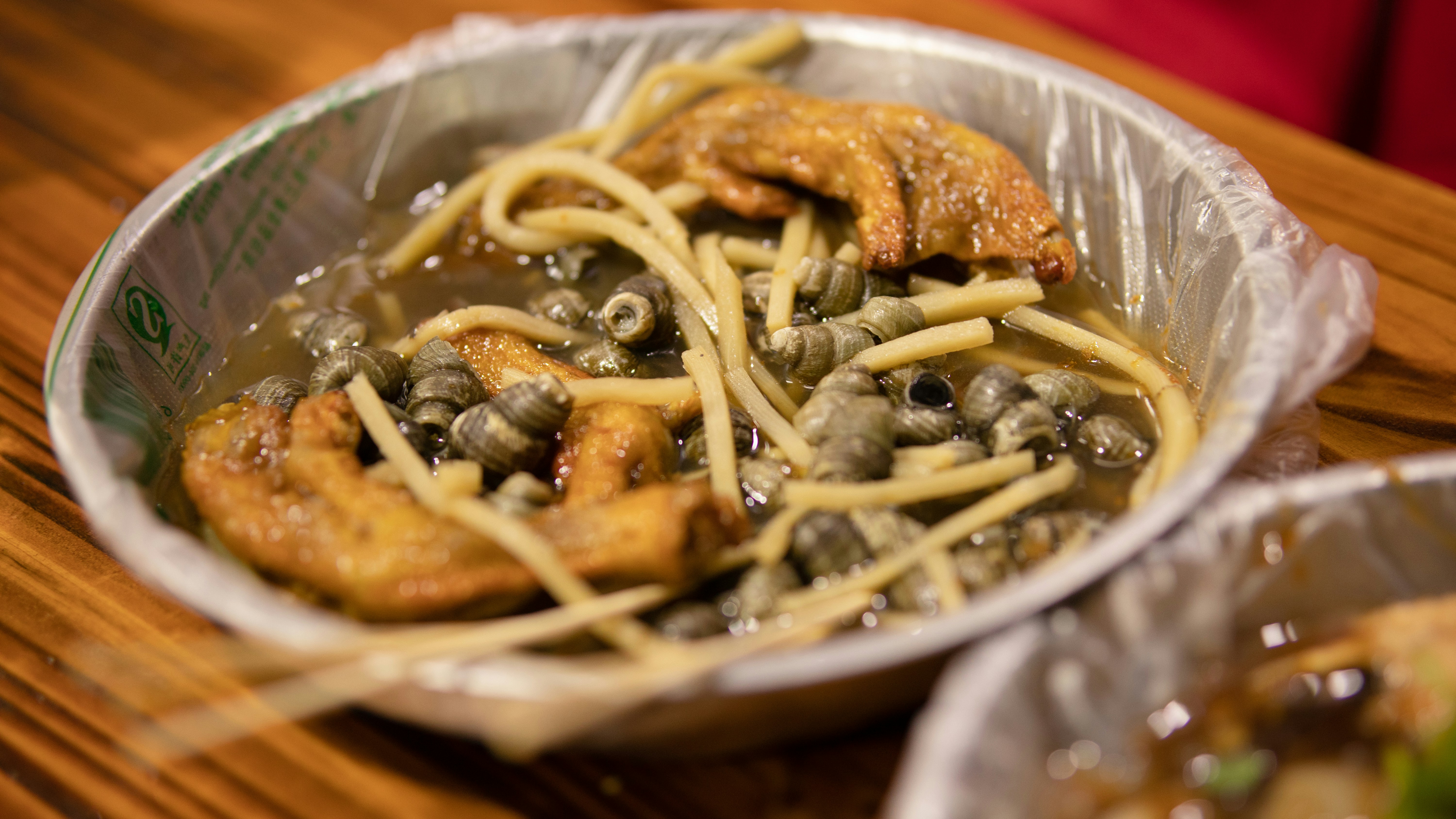 Foiled Comfort: Spaghetti with Clams and Mushrooms in a Shiny Takeout Bowl