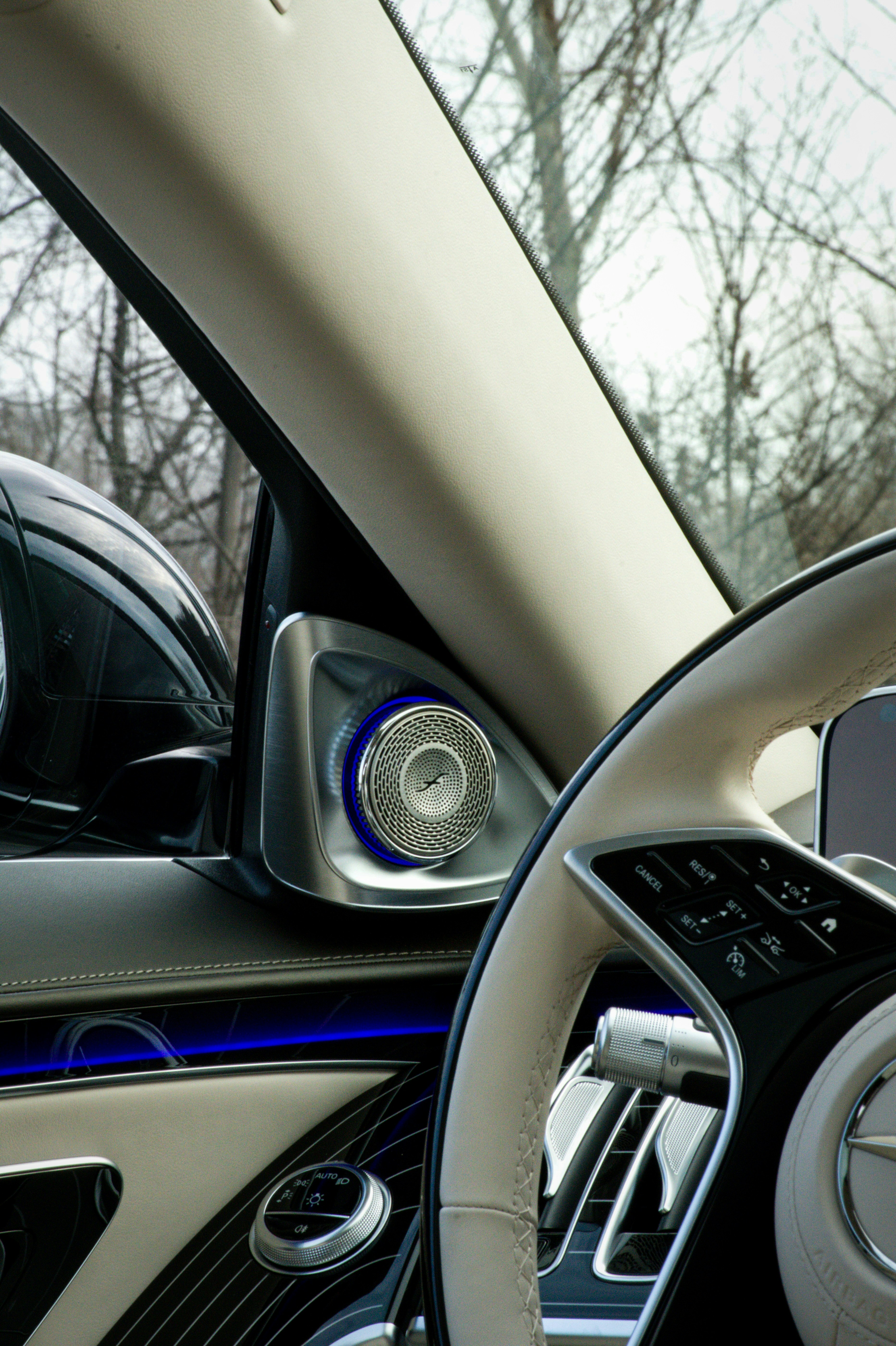 The interior of a car with a blue light on the dash photo – Free Spoke ...