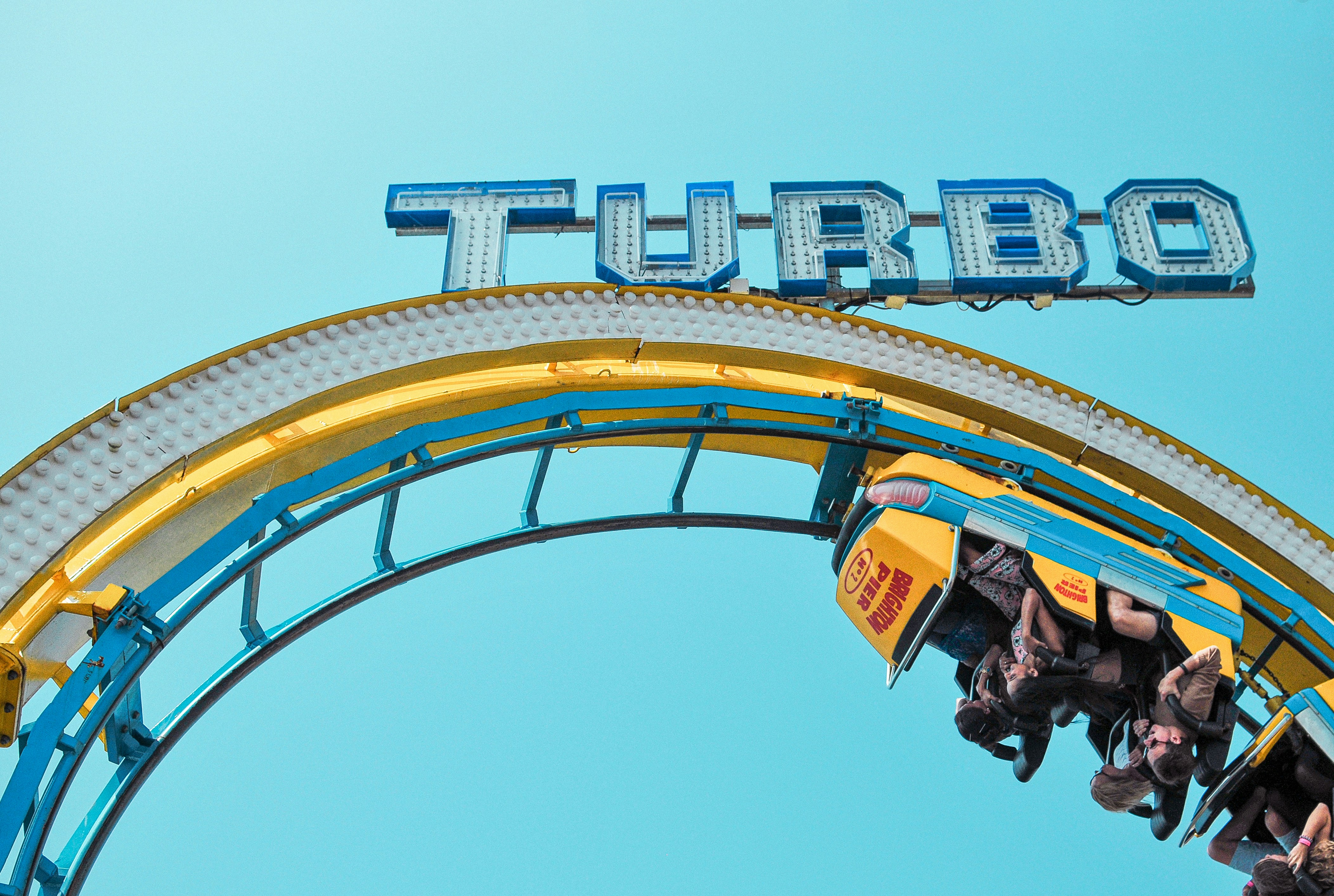 A roller coaster ride with the word turbo on it photo – Free Roller ...