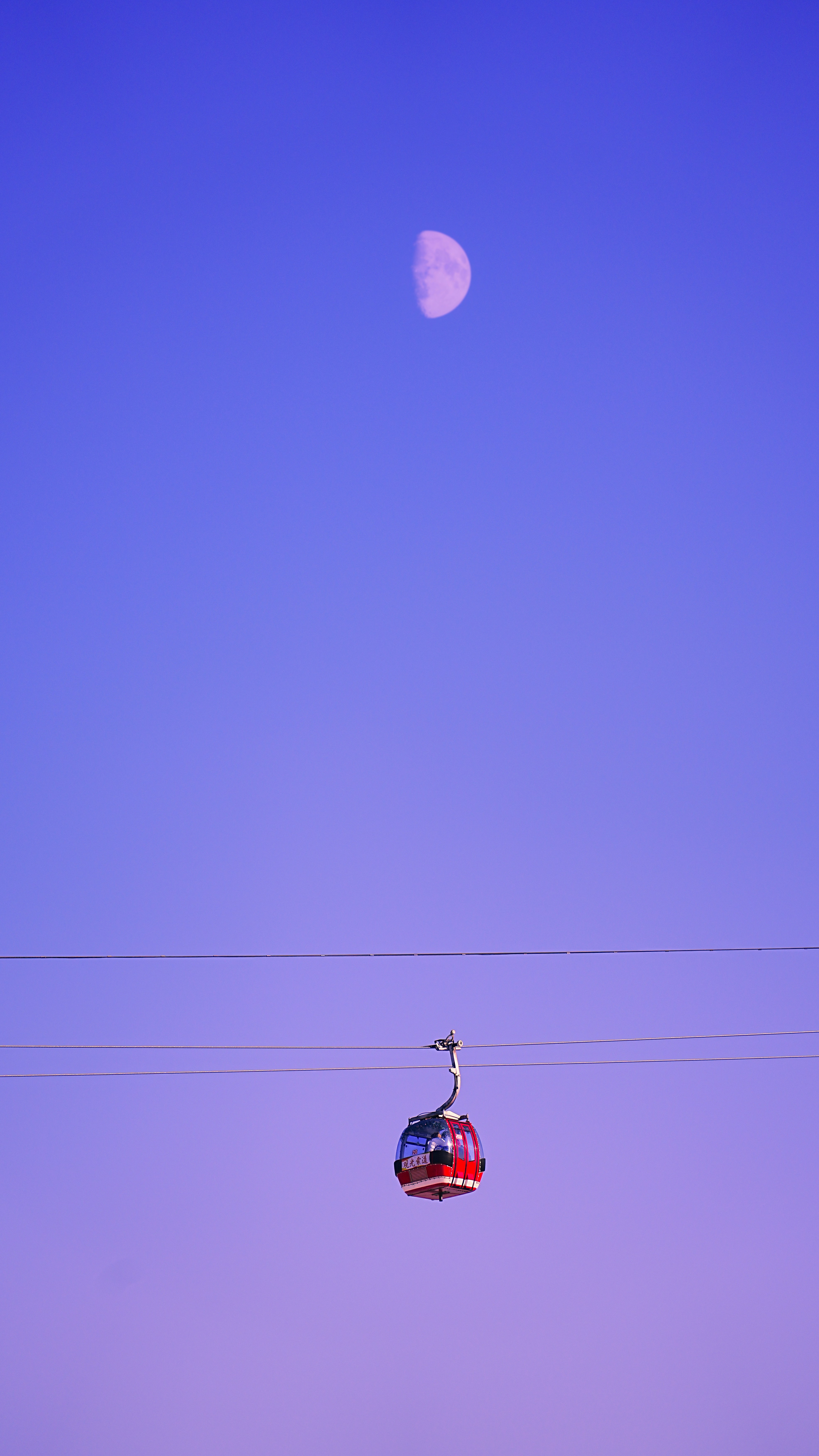 Gondola in Violet Sky: Moonlit Cable Car Glide