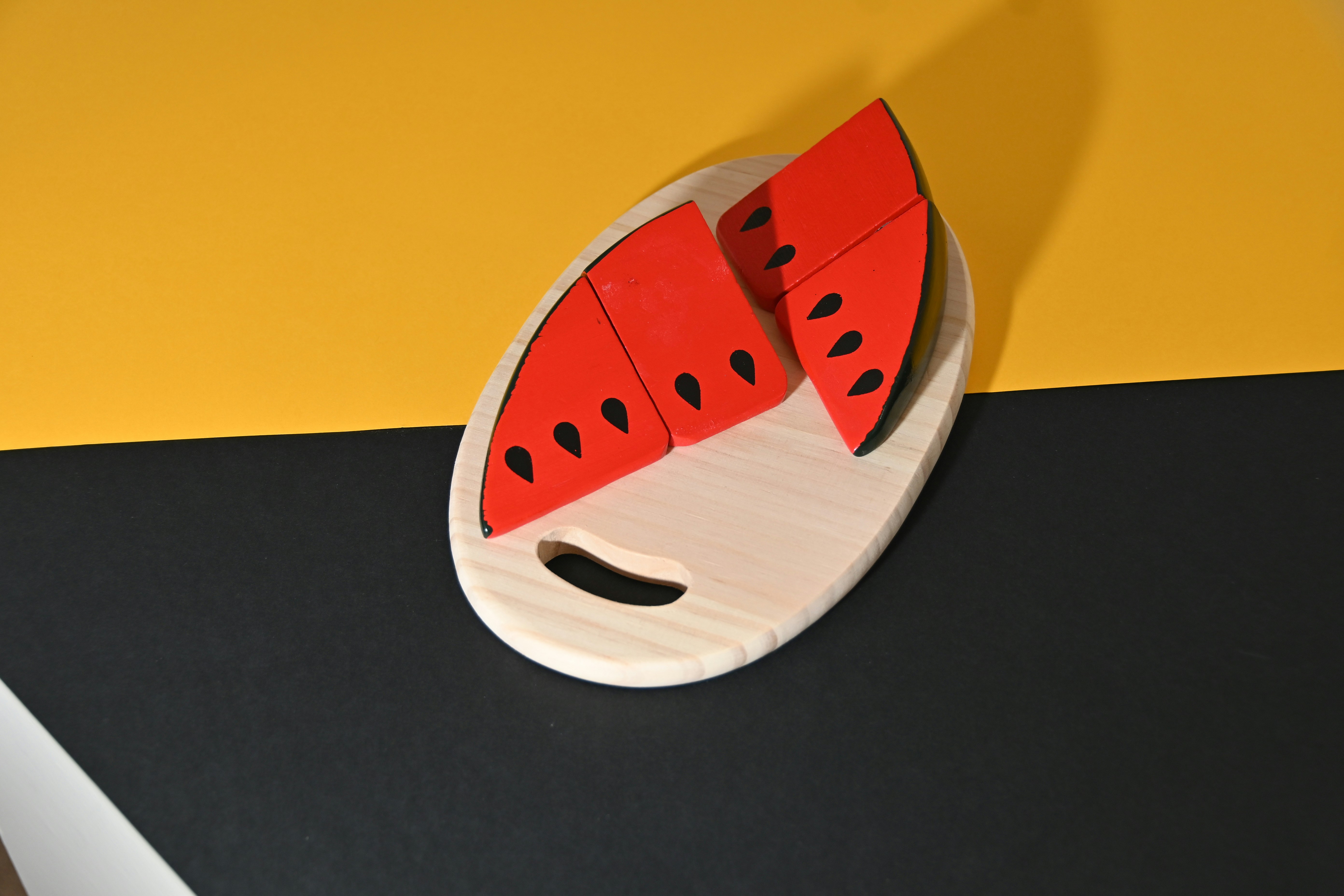 Slice of Color: A Watermelon Motif on a Geometric Stage