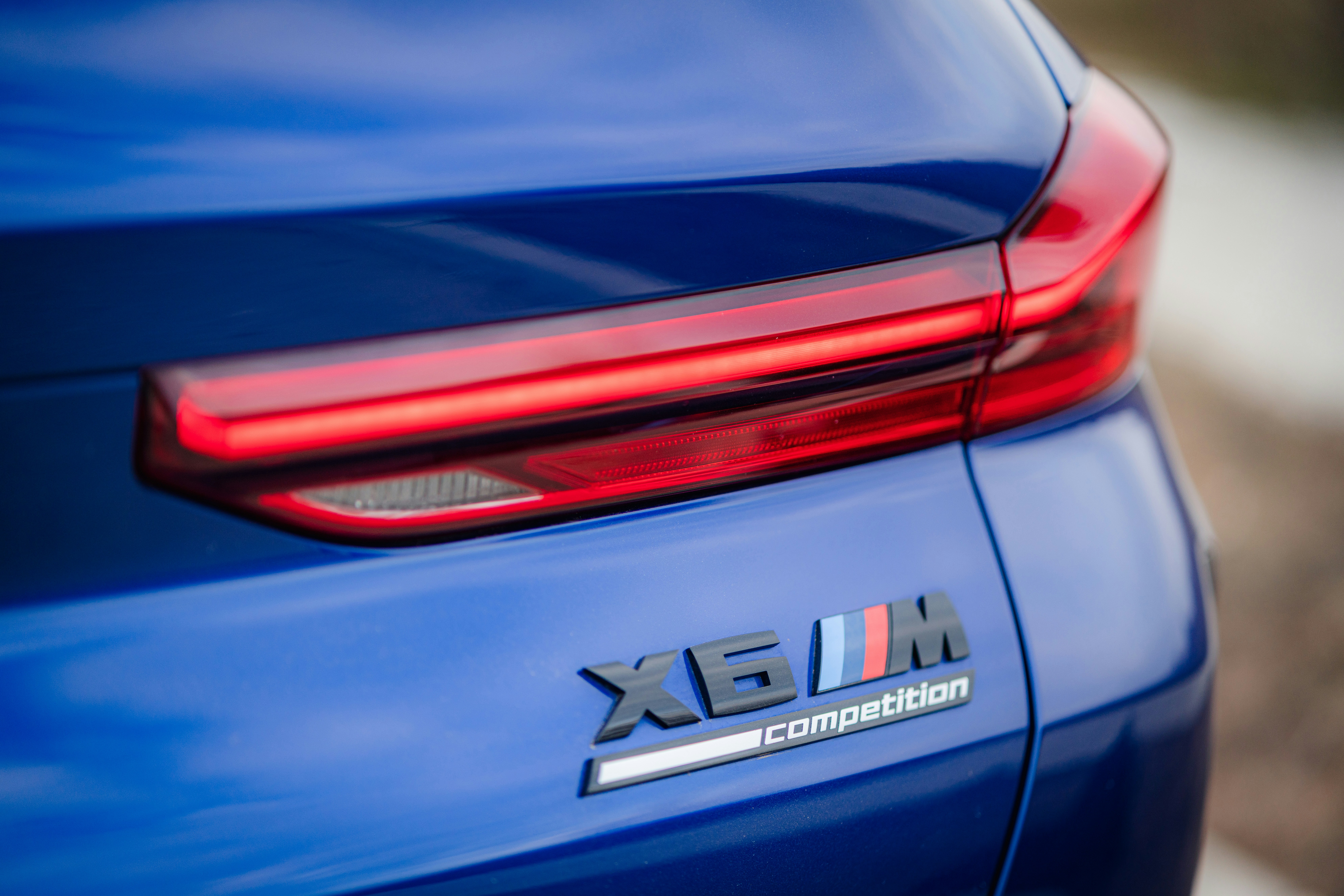 Blue X6M Competition Emblem: Precision in a Glint